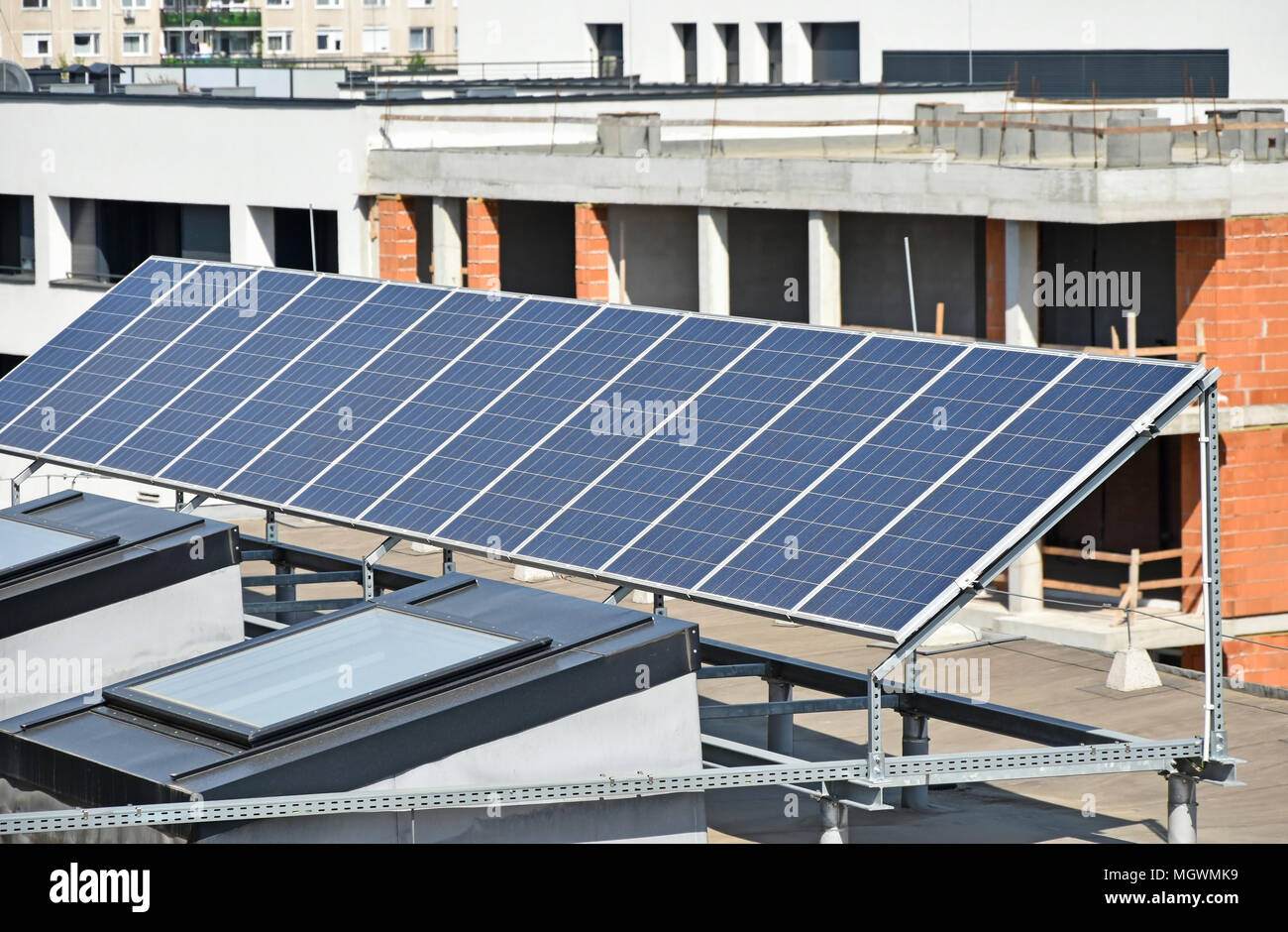 Solar panels on the top of a building Stock Photo - Alamy
