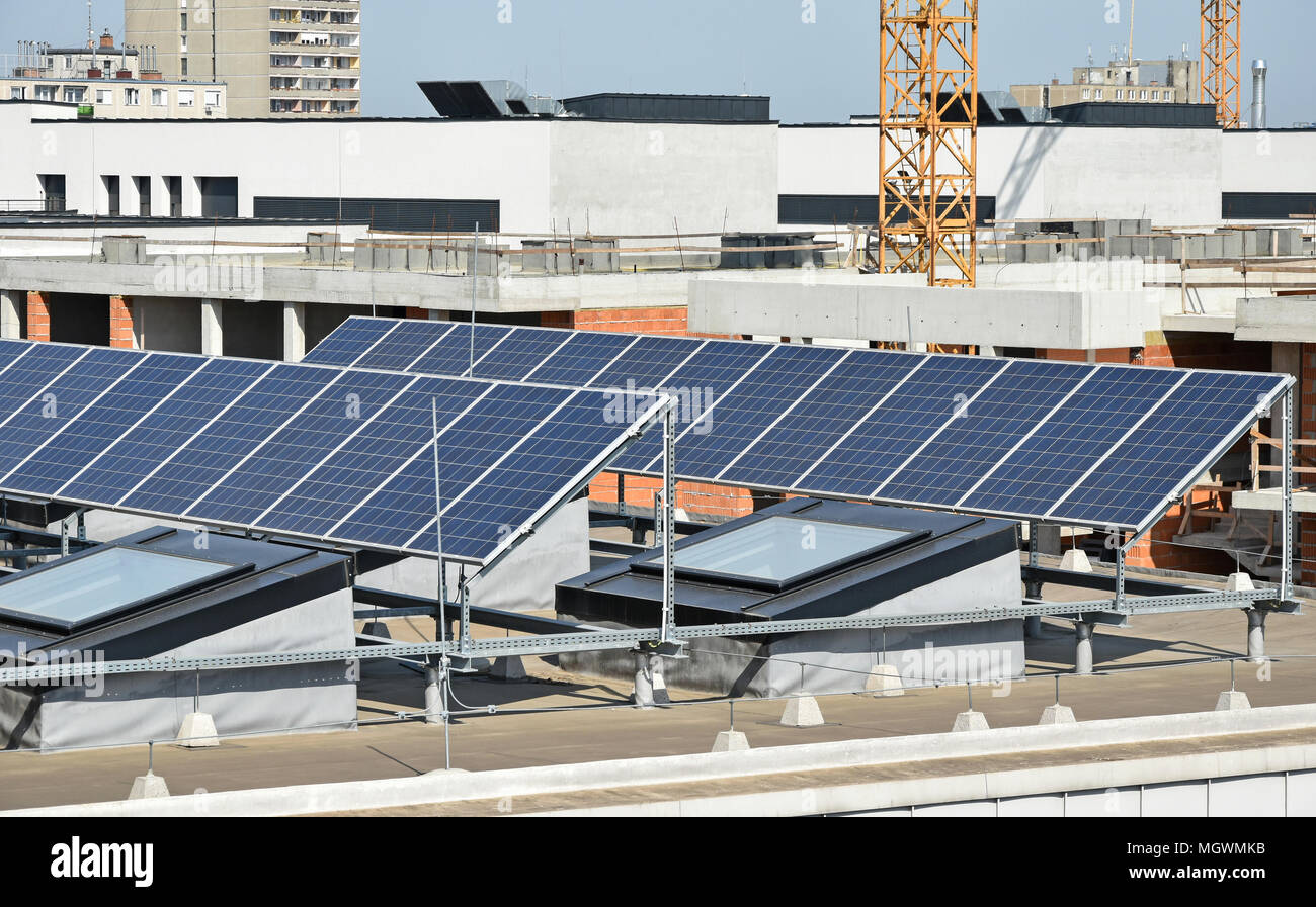 Solar panels on the top of a building Stock Photo - Alamy