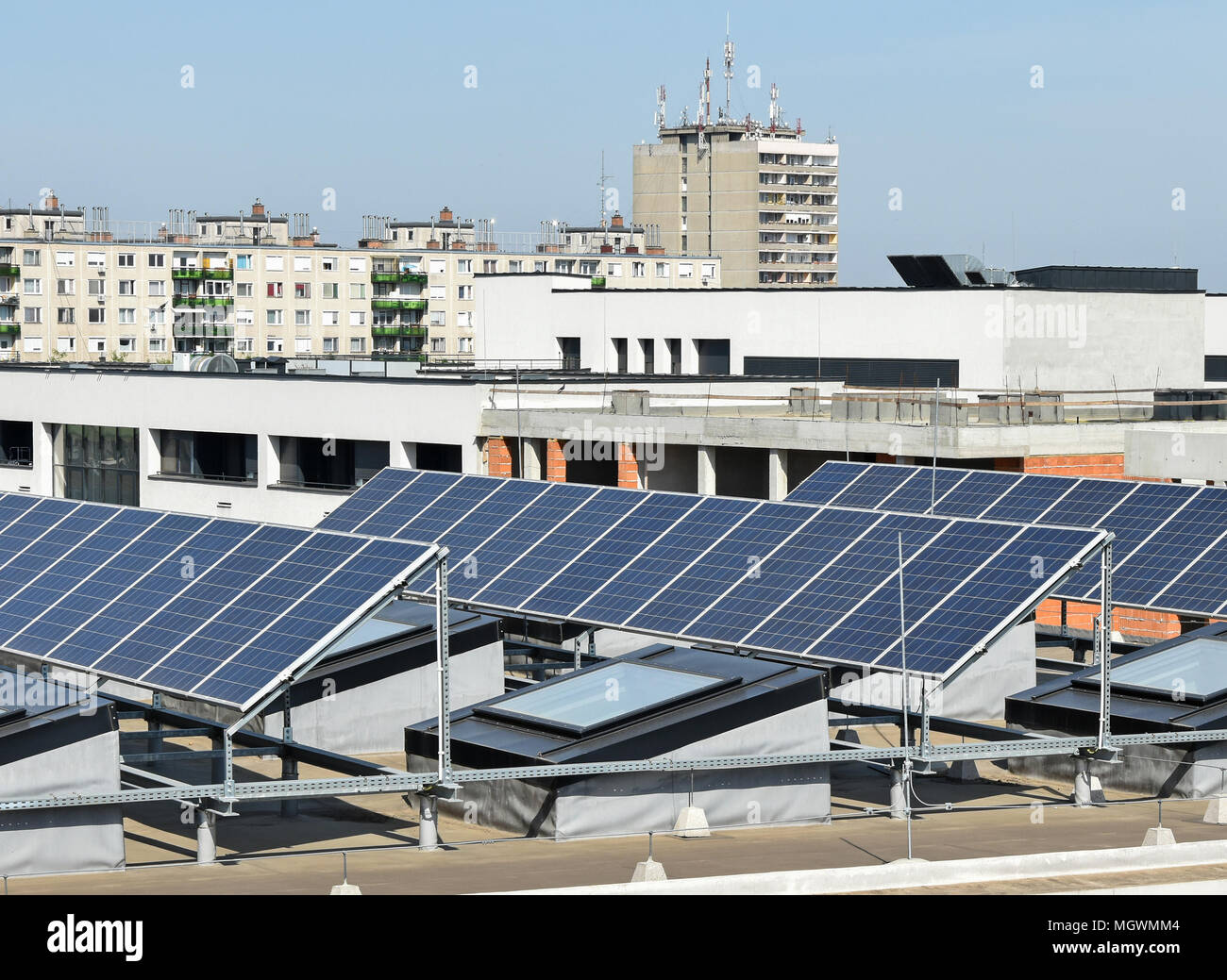 Solar panels on the top of a building Stock Photo - Alamy