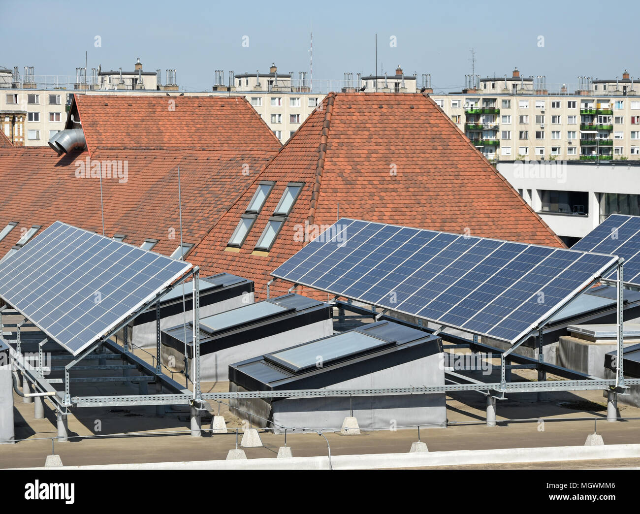 Solar panels on the top of a building Stock Photo - Alamy