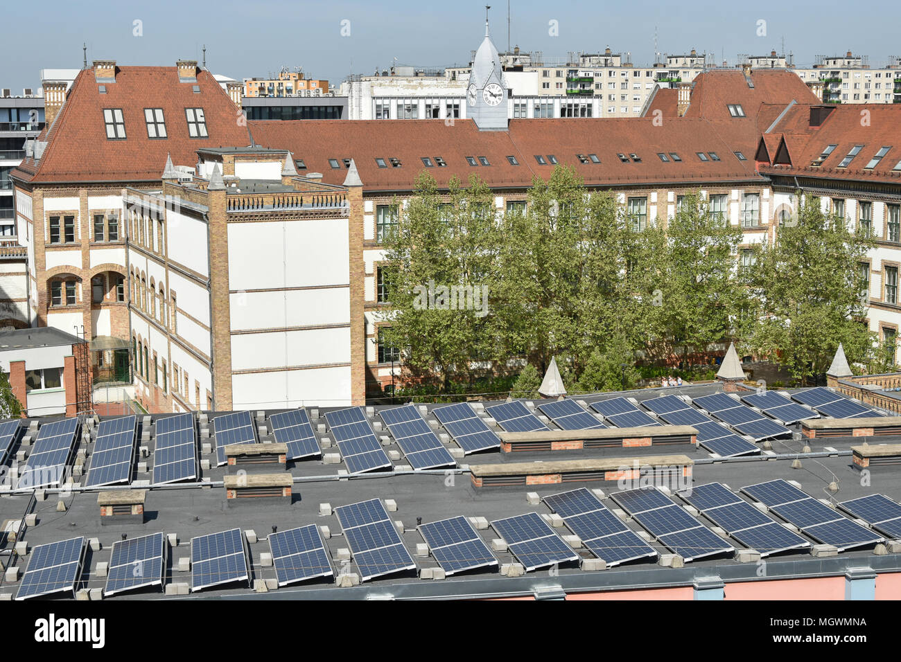 Solar panels on the top of a building Stock Photo - Alamy