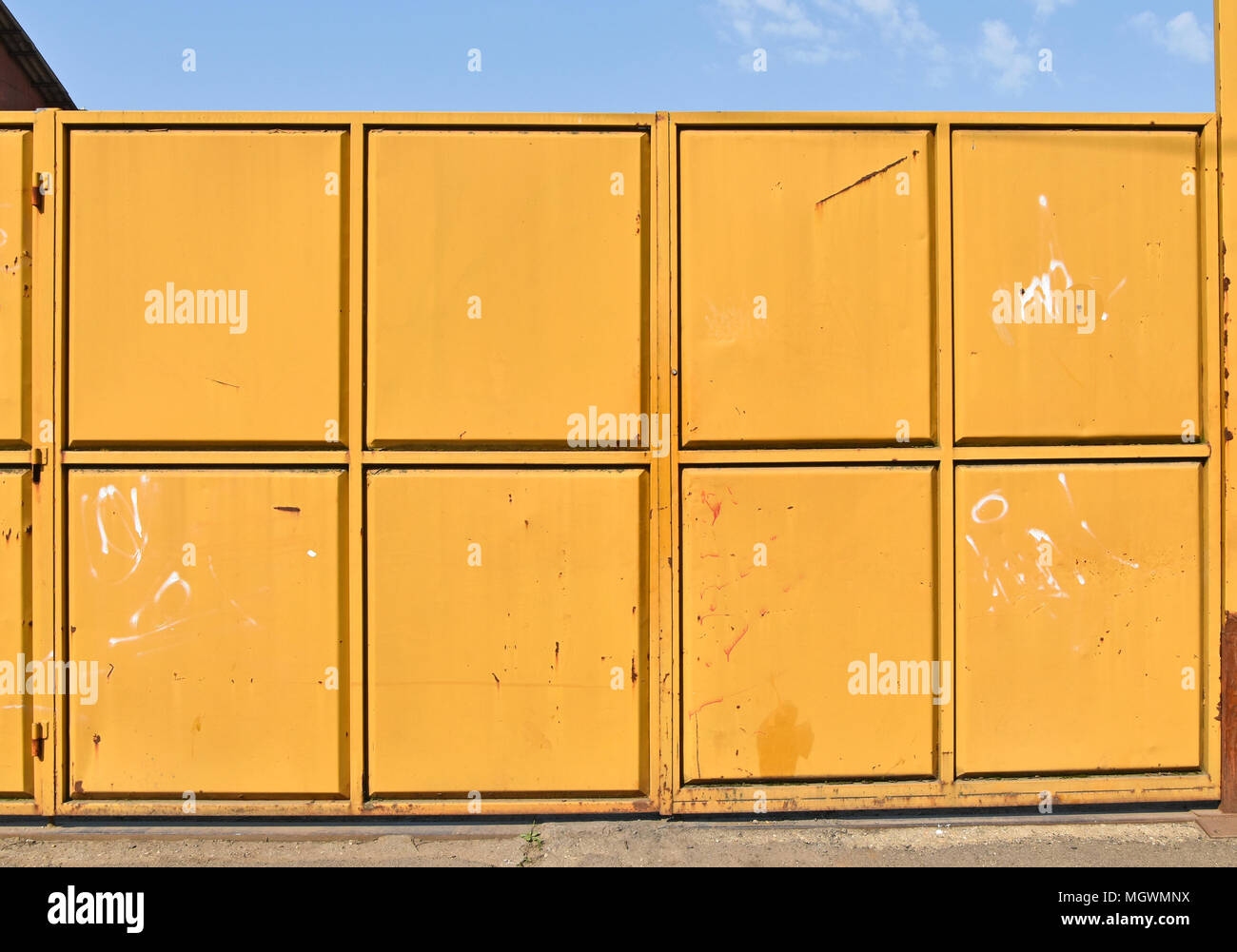 Large industrial metal door of the factory Stock Photo - Alamy