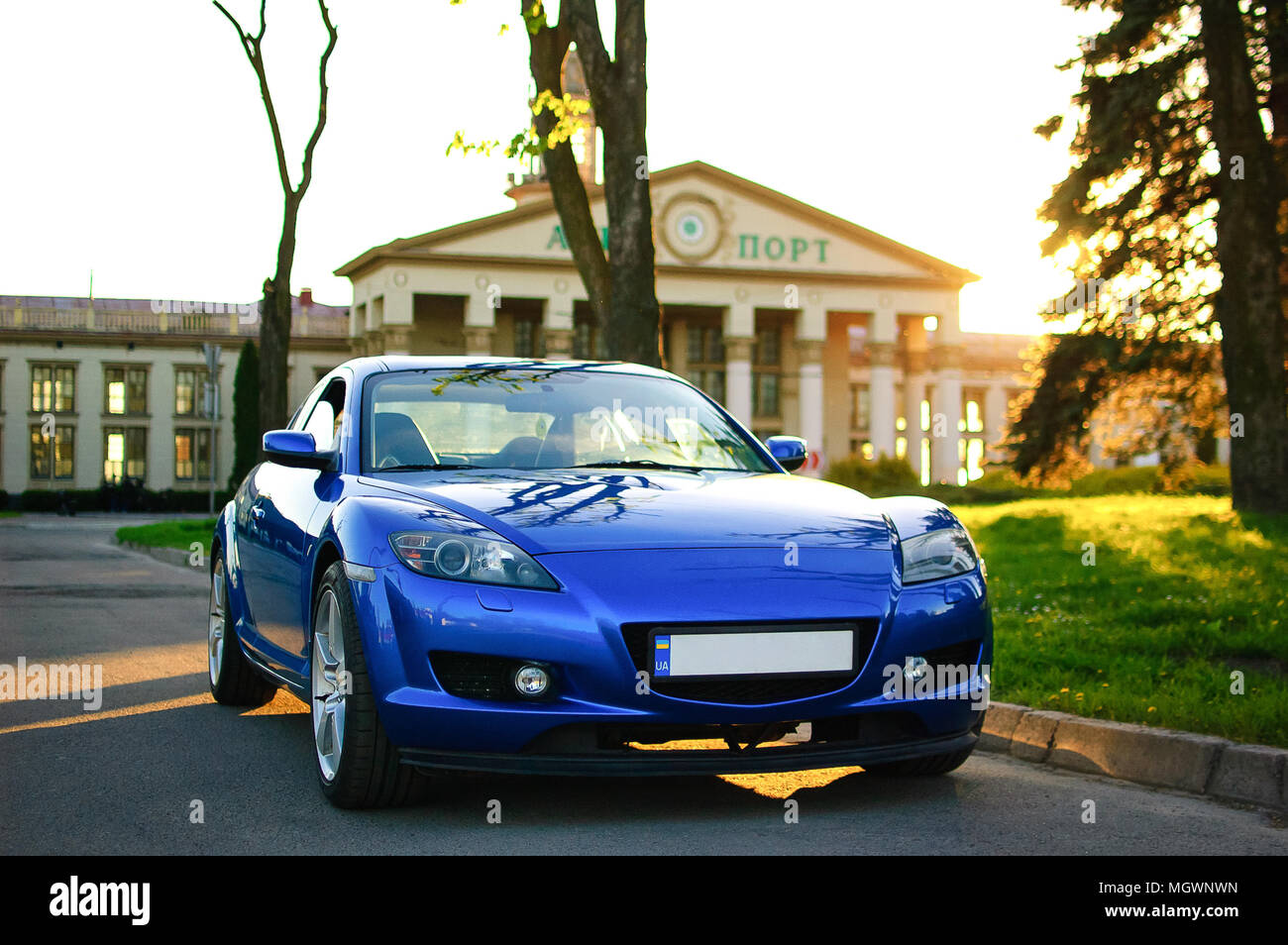 Blue Sport Car Parked on the Street on Airport s Building Background ...