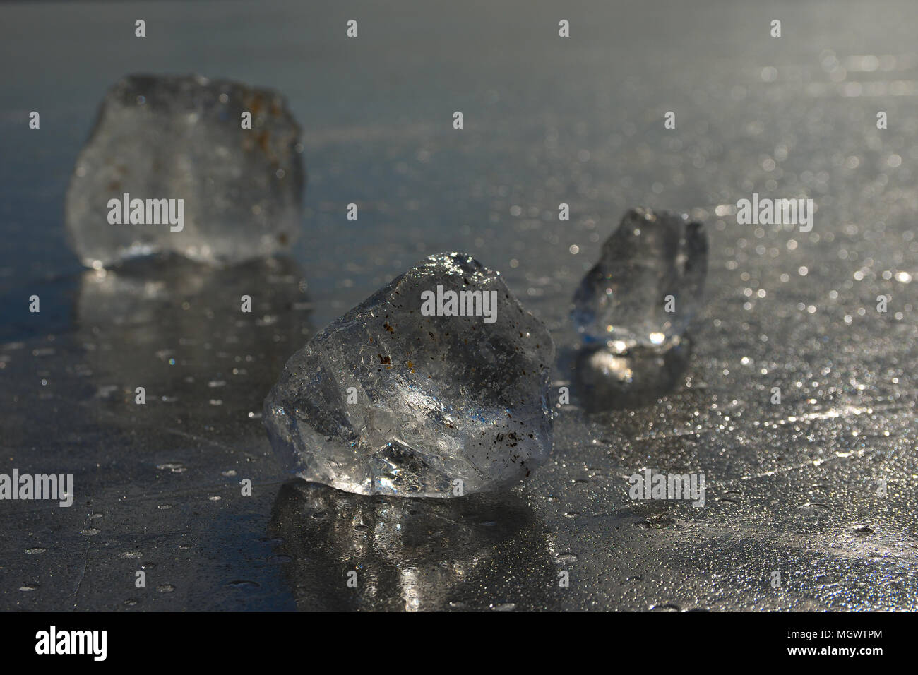 Abstract of frozen lake, textured pattern in pieces of ice. Flat glass ...