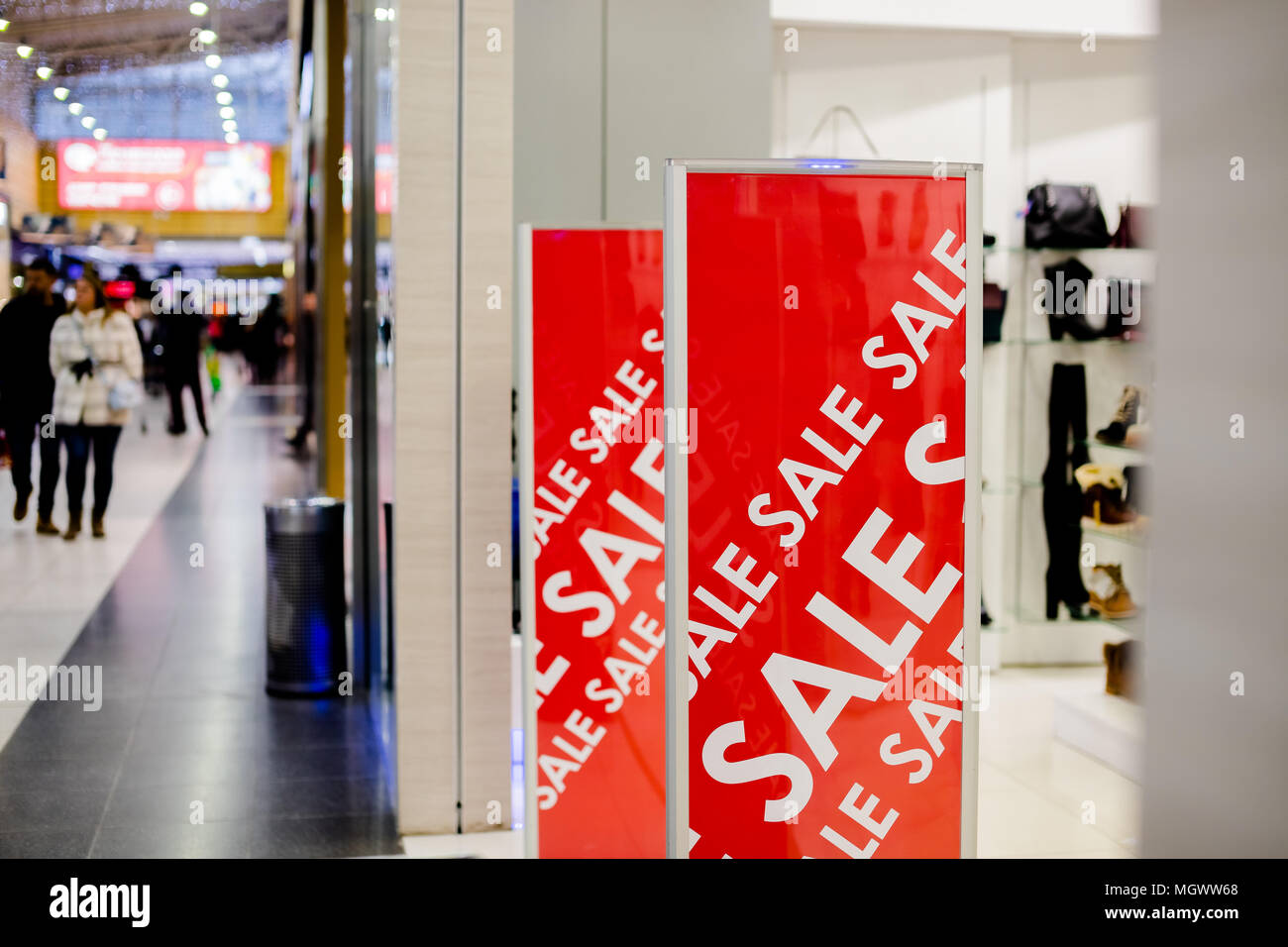 Boutique and Sale sign.Shop window display in the post about sales ...