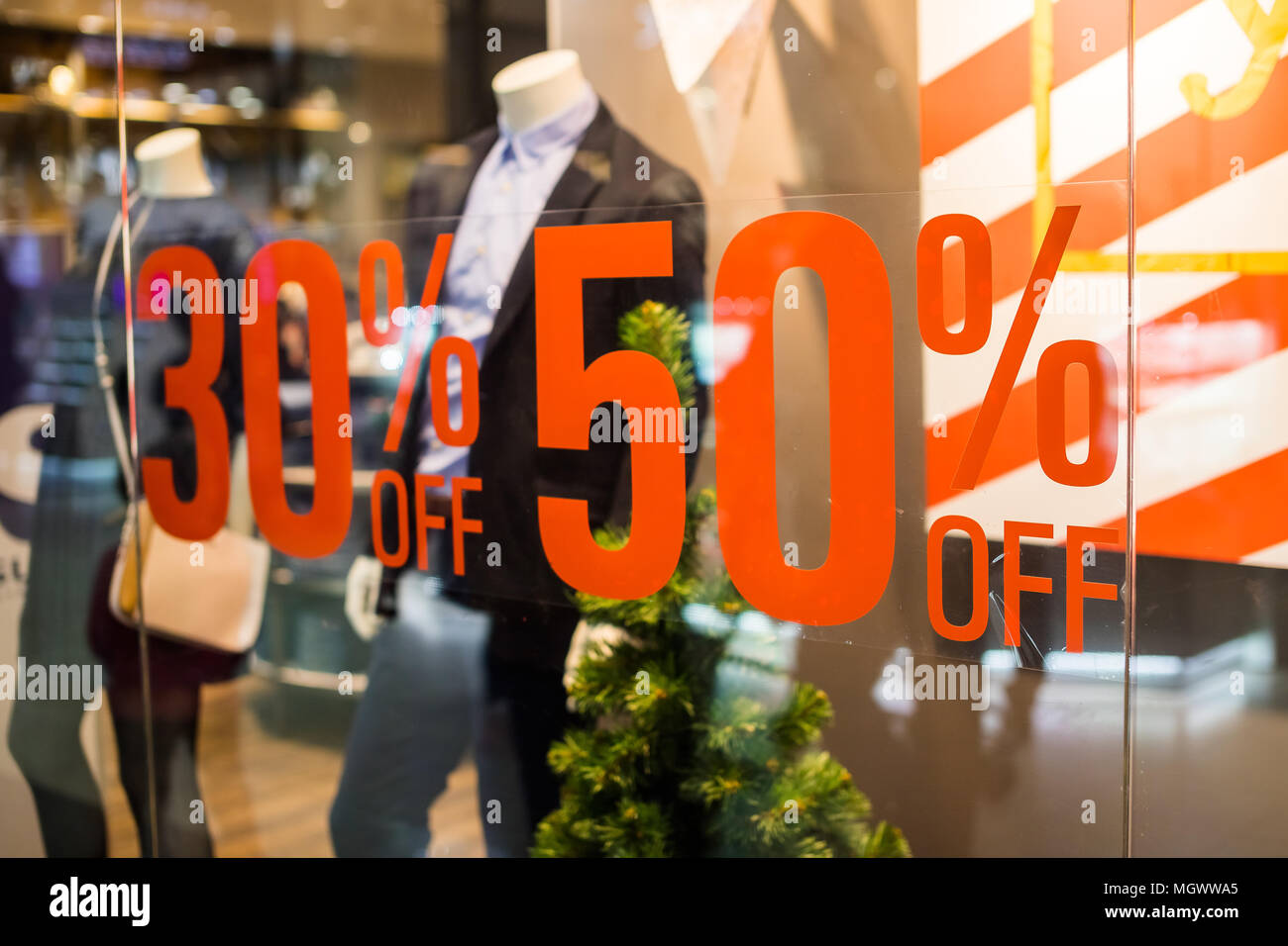 Boutique and Sale sign.Shop window display in the post about sales ...