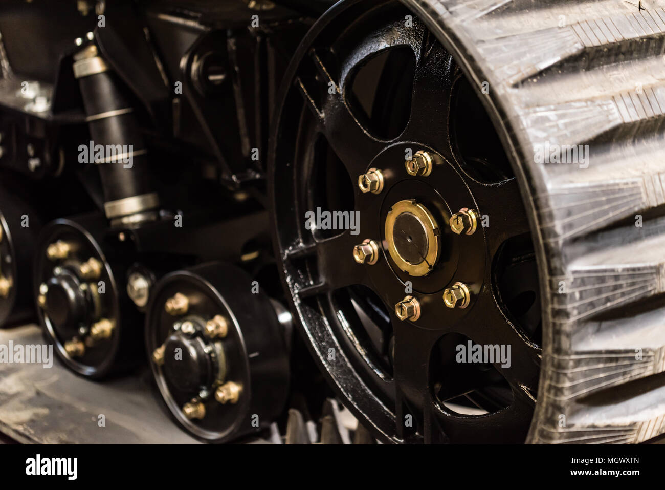 A closeup of rubber tractor tracks Stock Photo - Alamy