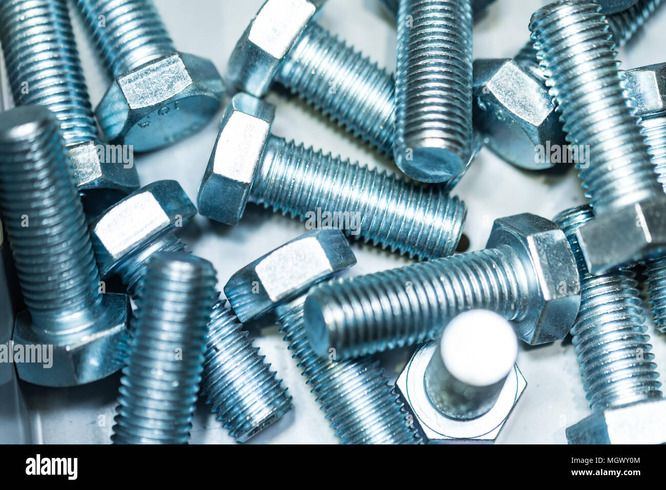 Close-up bolts background Stock Photo - Alamy