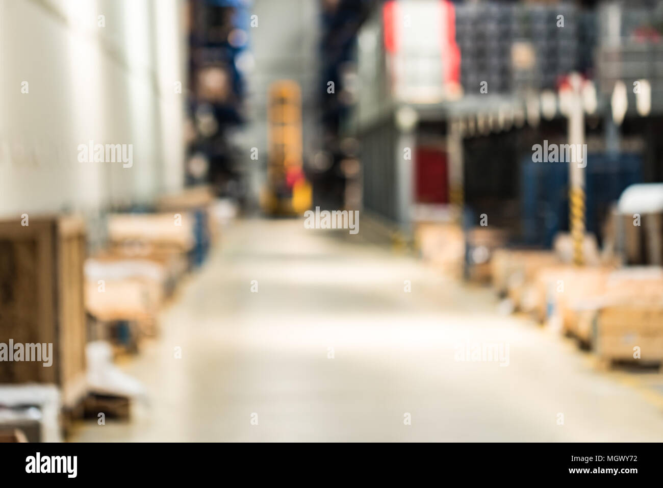Blurred interior of modern spare parts warehouse Stock Photo - Alamy