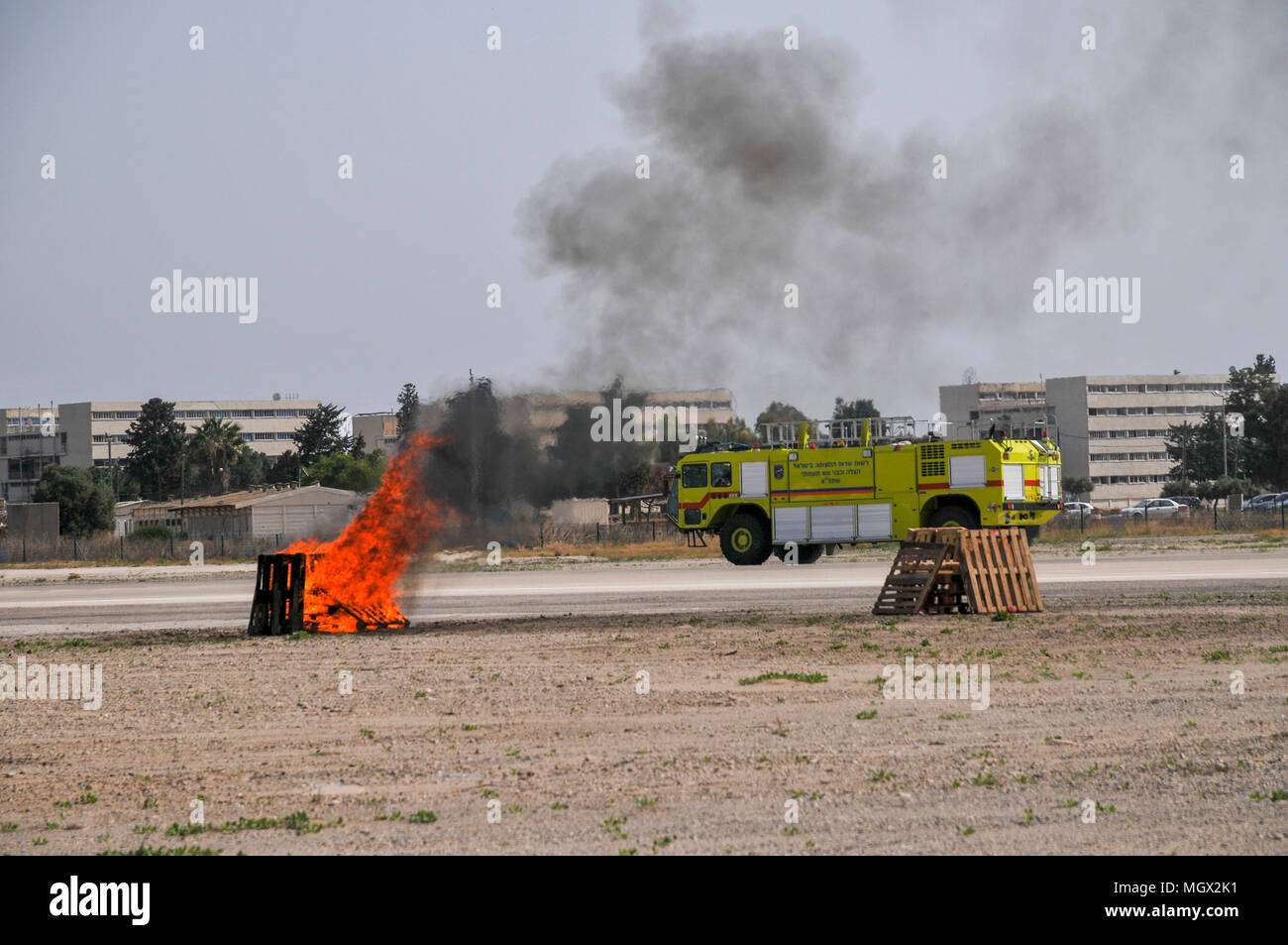 Israel Airport Authority fire truck extinguishes a fire during a ...