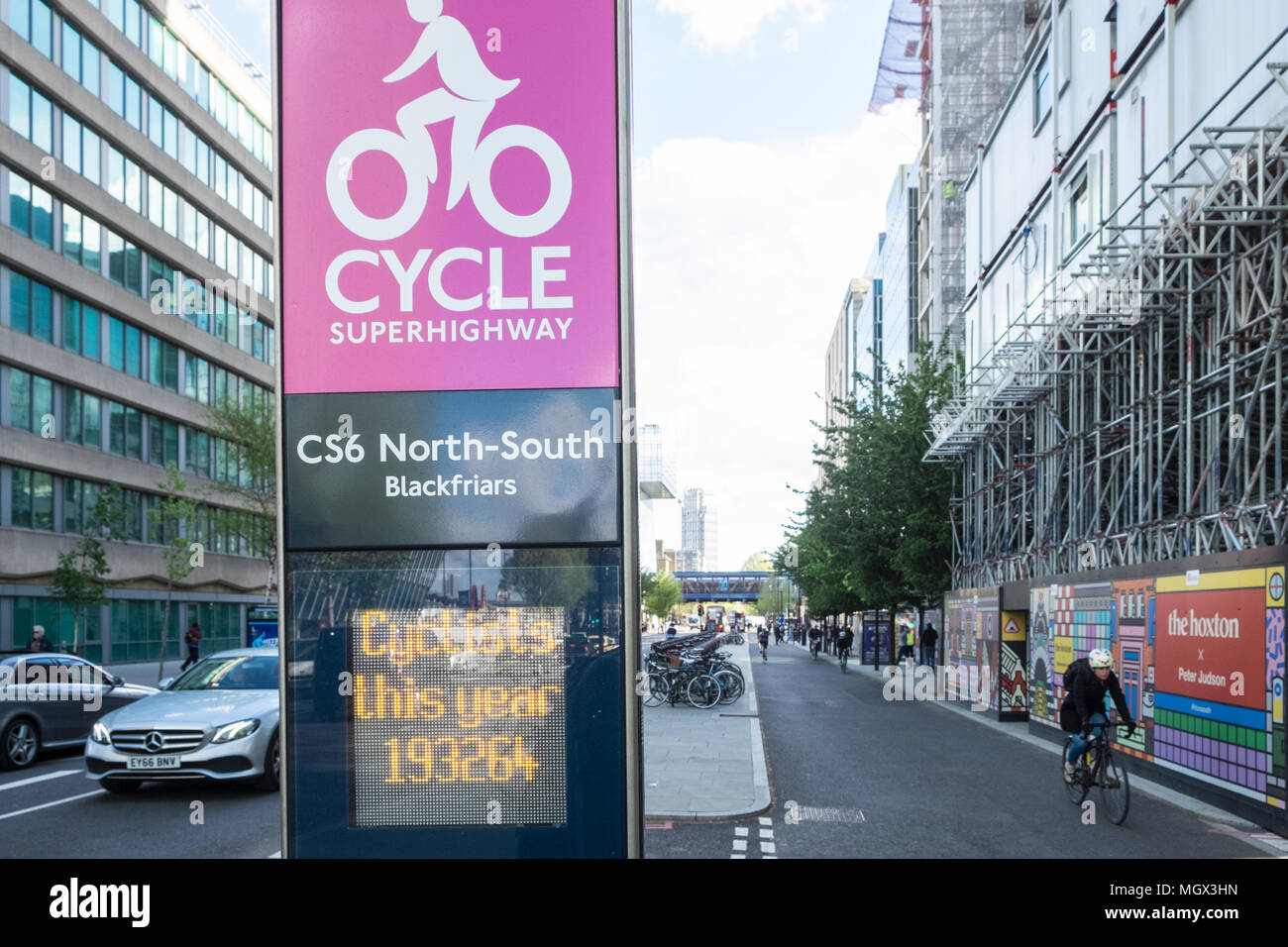 Cyclists use new cycle lane hi-res stock photography and images - Alamy