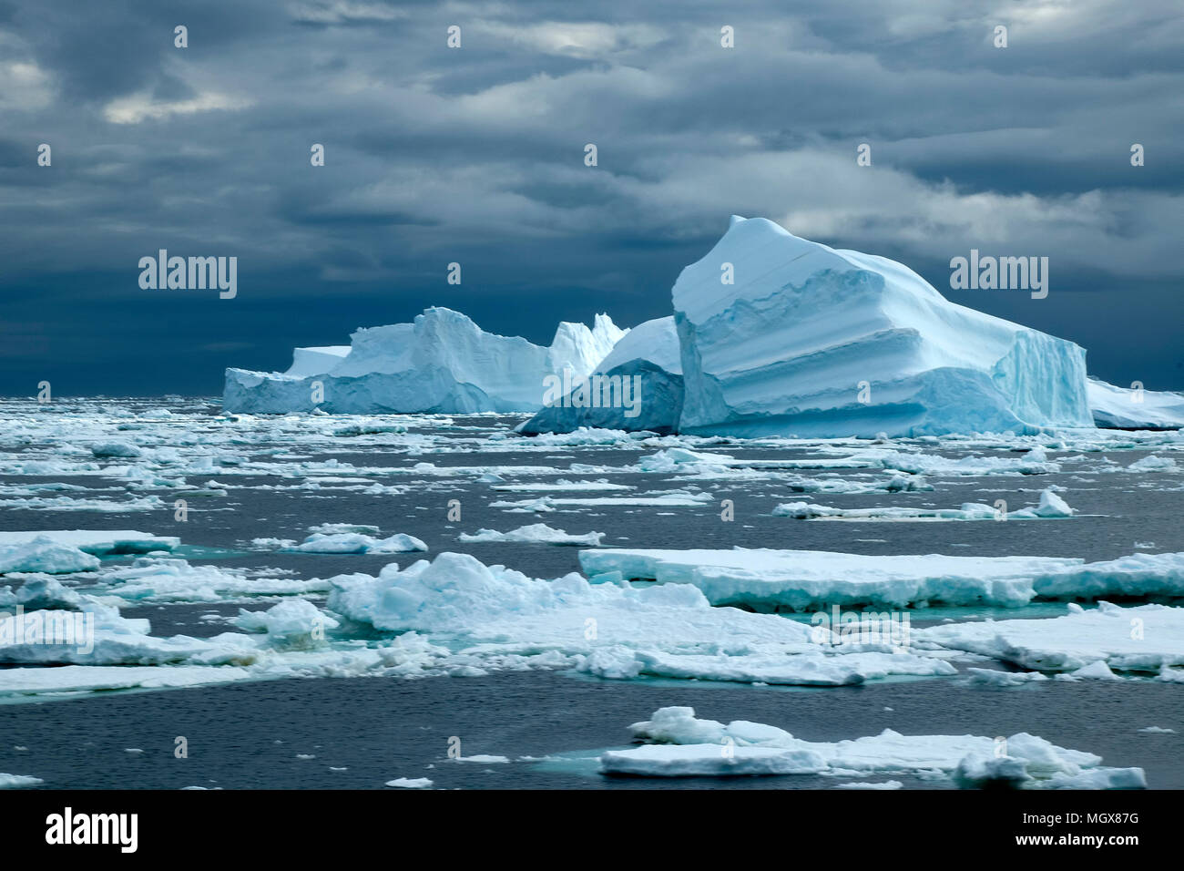 Southern Ocean Antarctica, iceberg field with stormy sky Stock Photo ...