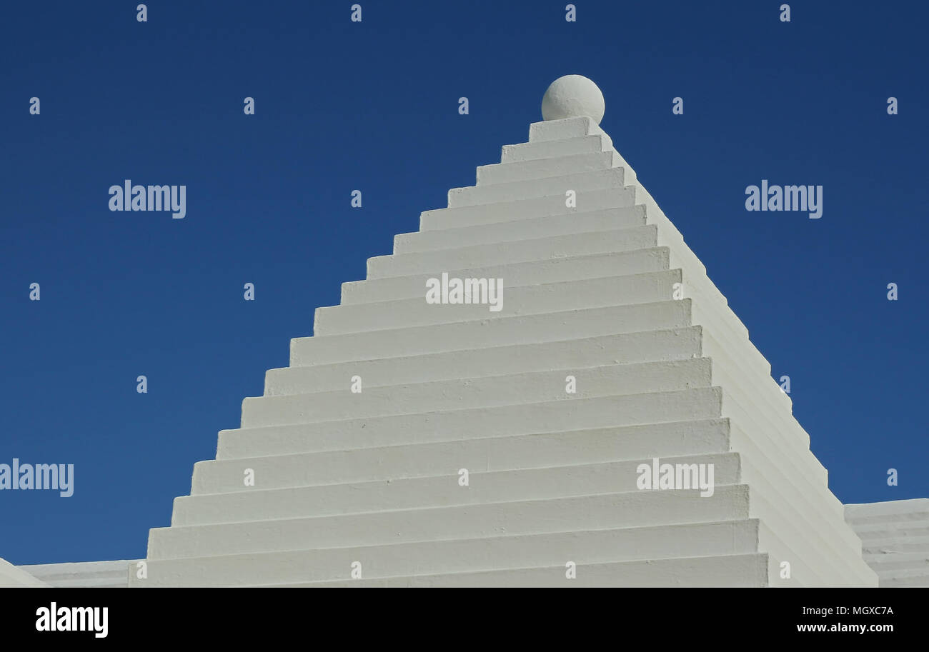 A typical White Bermuda Buttery Roof, against a deep blue sky Stock ...