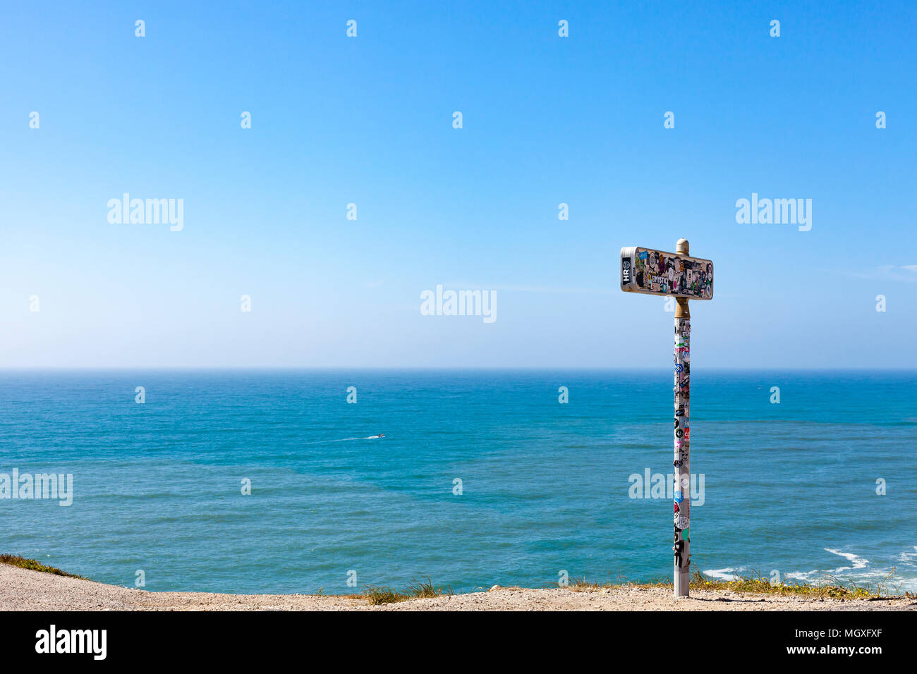 Traffic sign covered with sticker hi-res stock photography and images ...