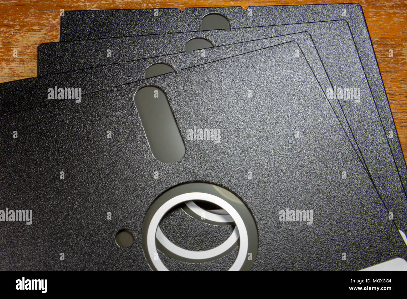 Front view of several 5¼-inch floppy disks sitting on a table Stock ...