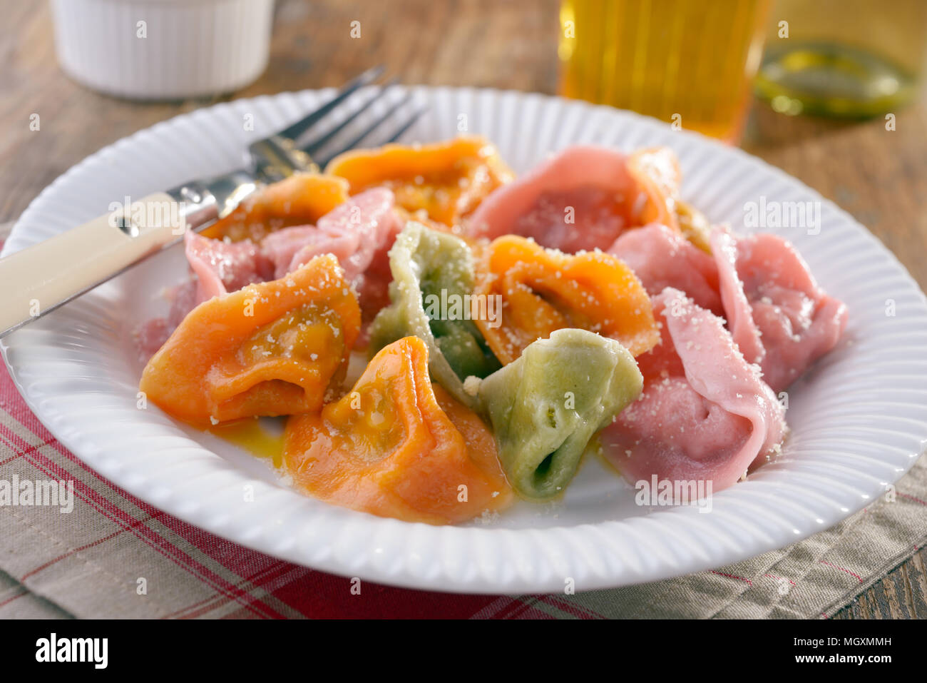 Multi-colored ravioli with spinach and ricotta Stock Photo - Alamy