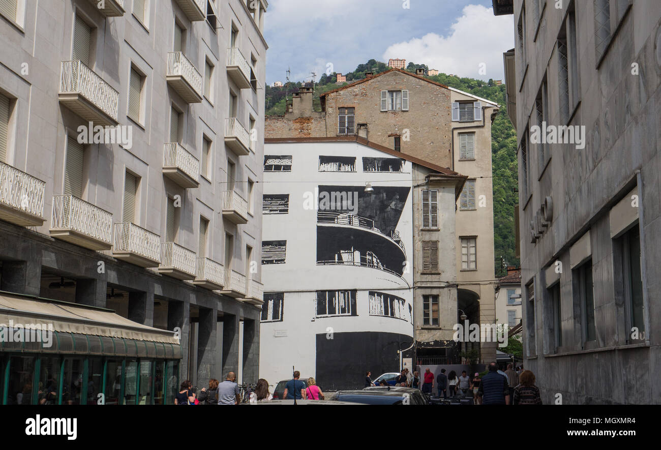 facades of buildings in a street in the center of Como Stock Photo - Alamy