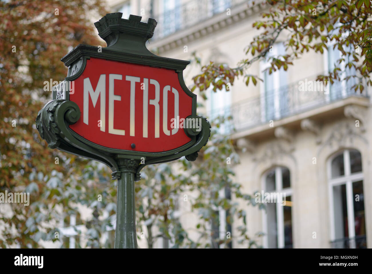 Metro sign marking the entrance to subway in Paris, France Stock Photo ...