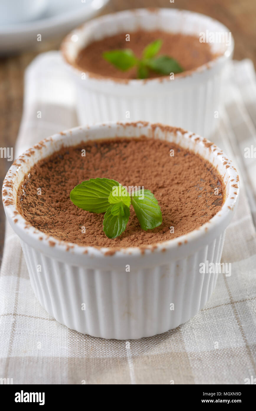Chocolate flan in a ramekin closeup Stock Photo - Alamy