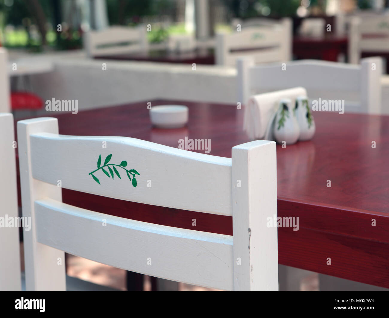 Empty tables in a street restaurant Stock Photo - Alamy