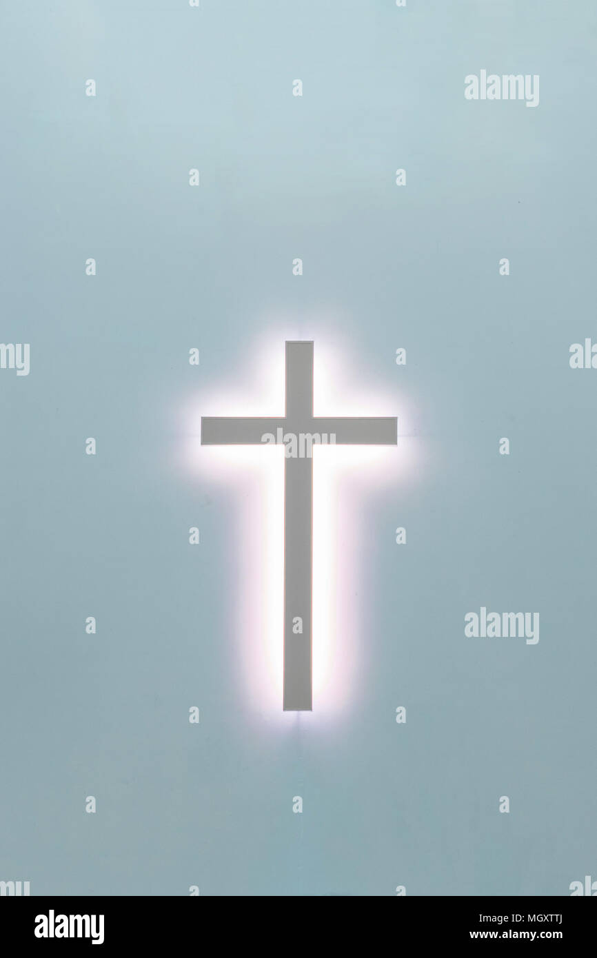 Christian cross on a blue background. a symbol of Christianity ...