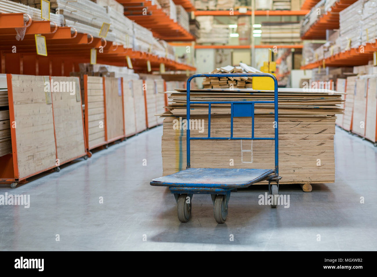 shop of building materials. Racks with boards, wood and building ...