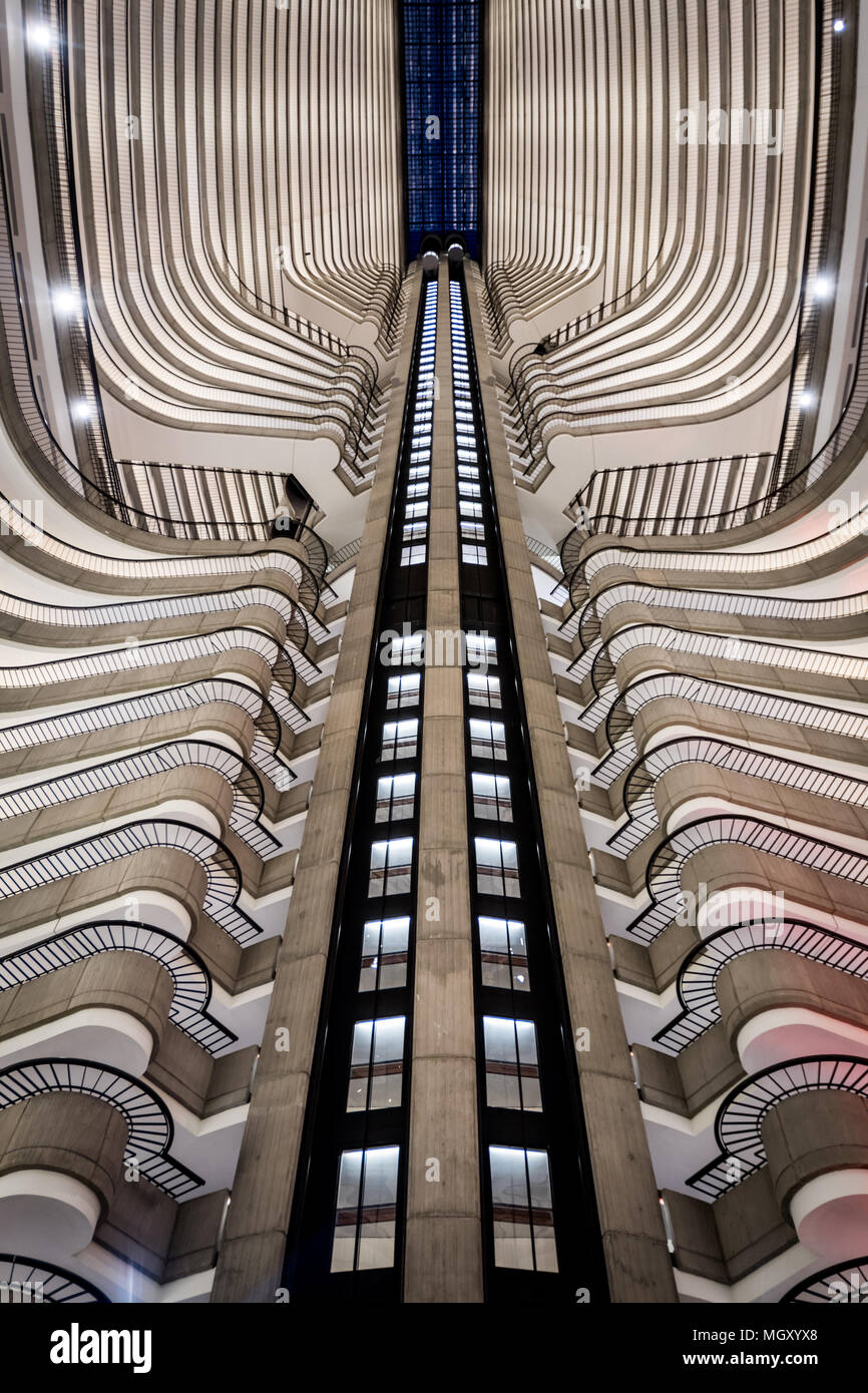 Looking Up at Glass Elevator Shaft in tall building Stock Photo - Alamy