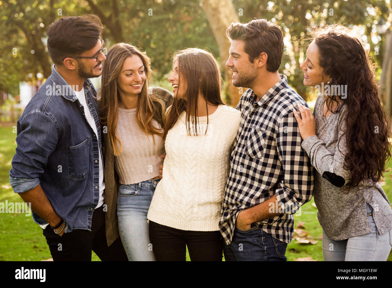 Hispanic group park walk hi-res stock photography and images - Alamy