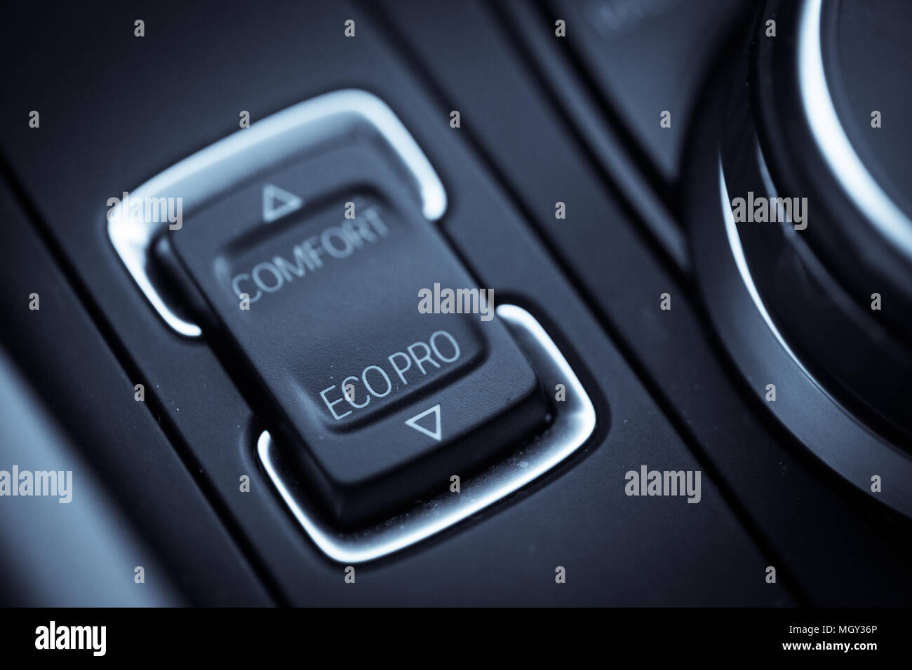 Close up shot of a comfort and eco pro mode button in a car Stock Photo ...