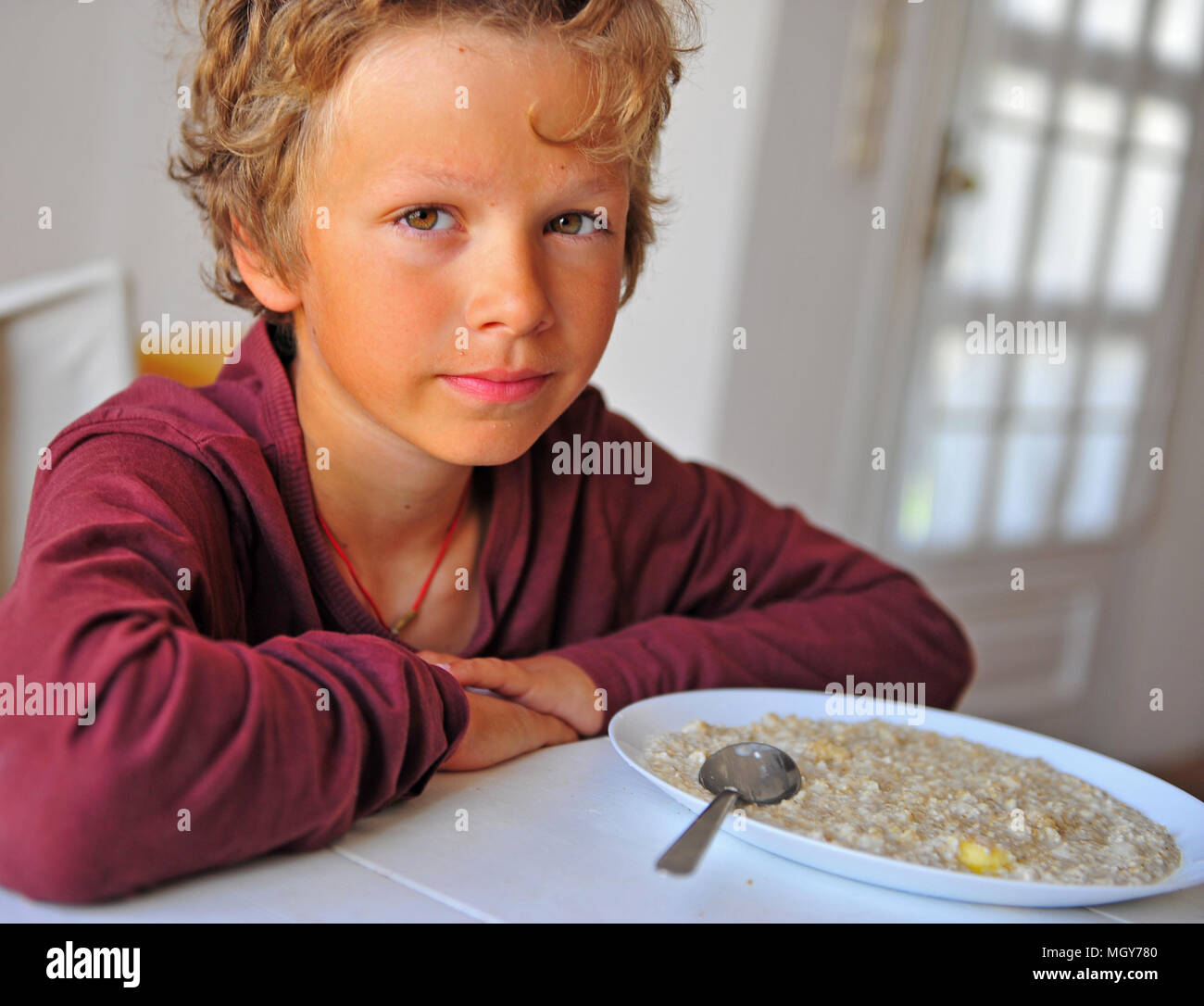 Boy ready to have his breakfast on morning Stock Photo - Alamy