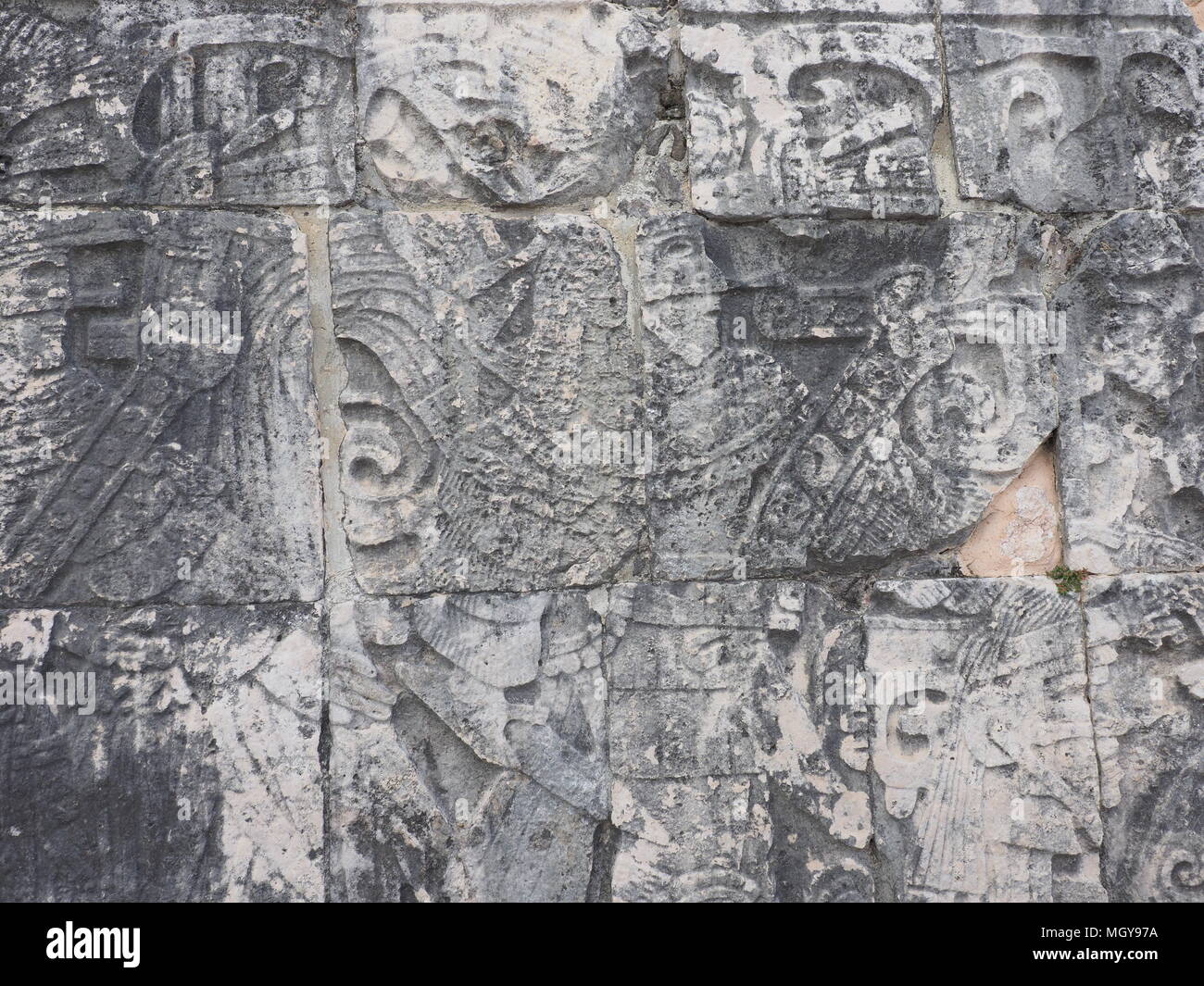 Part of ancient mayan stony relief with pictograph at ruins of Chichen ...