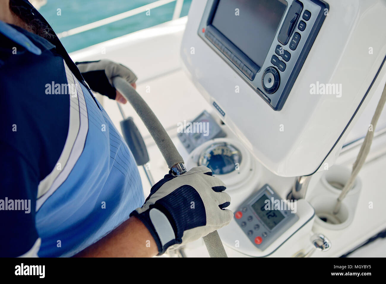 Man steer ship yacht hi-res stock photography and images - Alamy