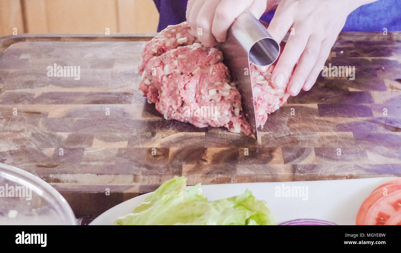 Preparing gourmet burger patties with ground beef Stock Photo - Alamy