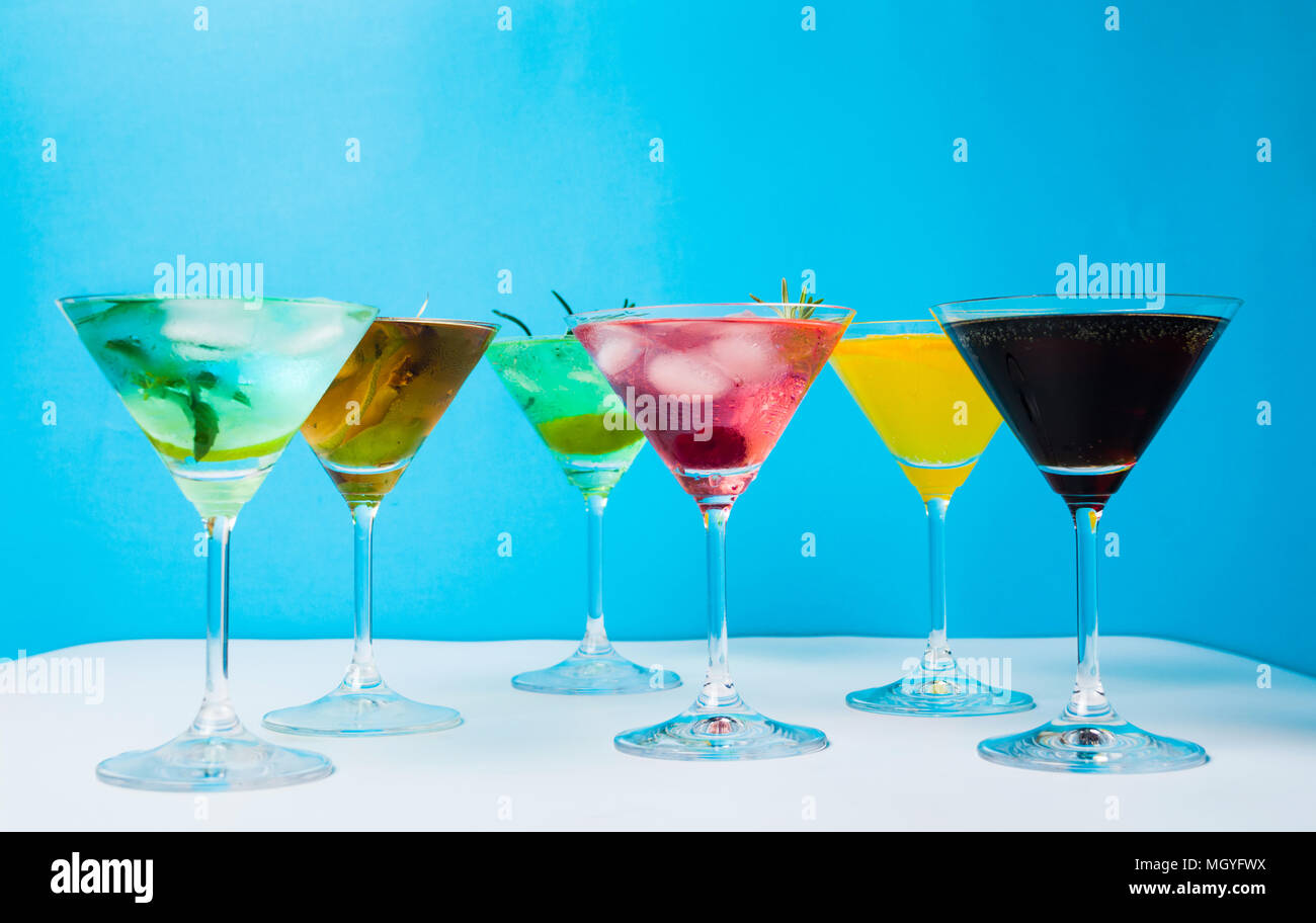 Colorful cocktails against blue background. Summer refreshments Stock ...