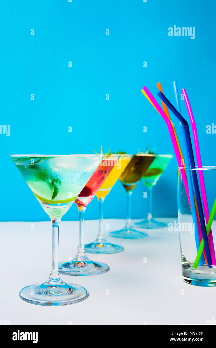 Colorful cocktails against blue background. Summer refreshments Stock ...