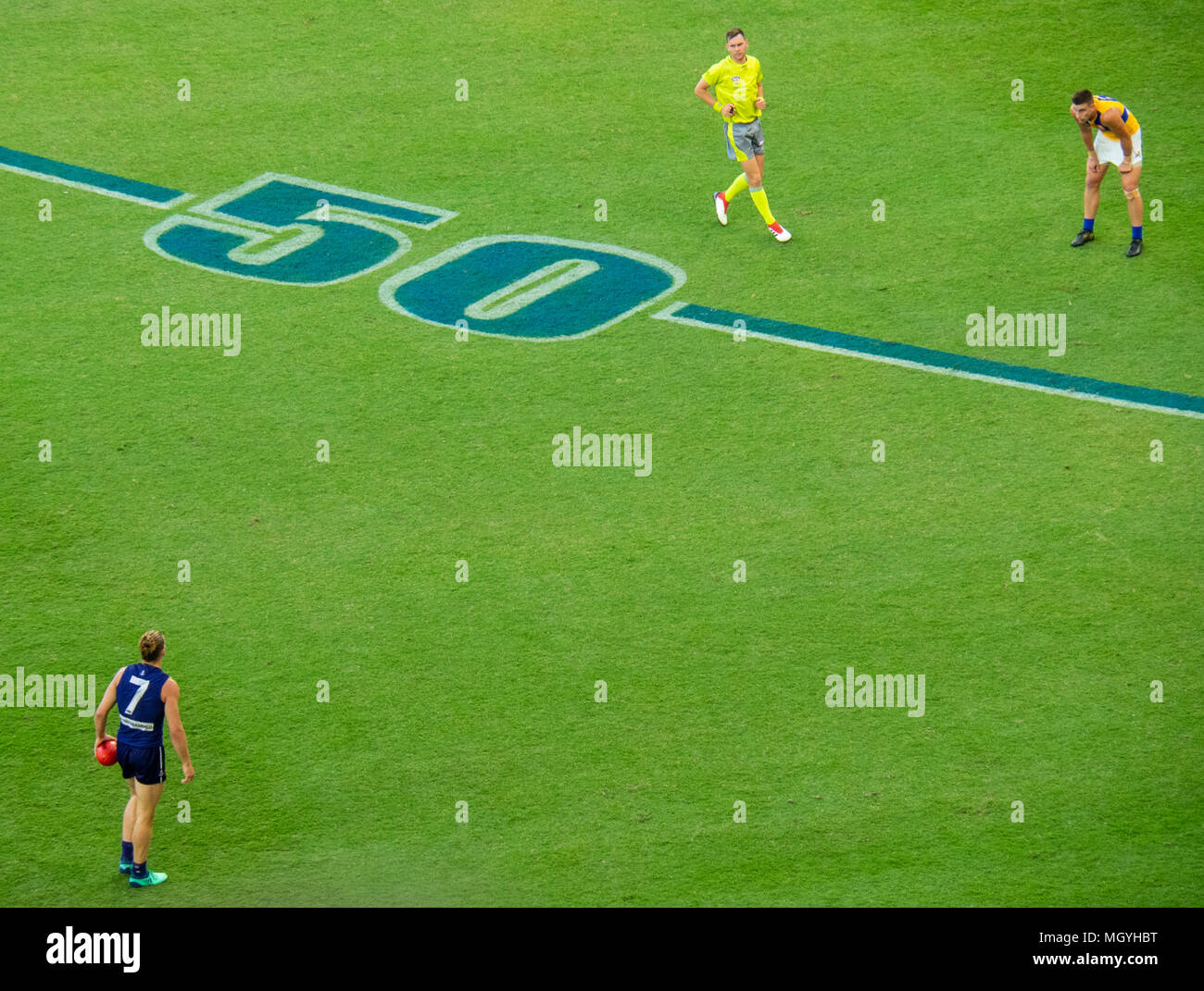Kicking footy australia hi-res stock photography and images - Alamy