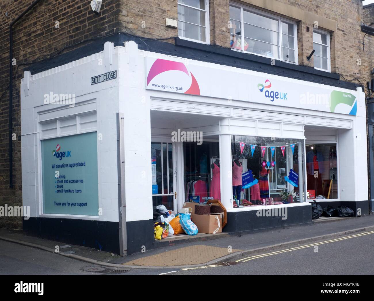 Donations left outside the Age Concern shop in New Mills, Derbyshire ...