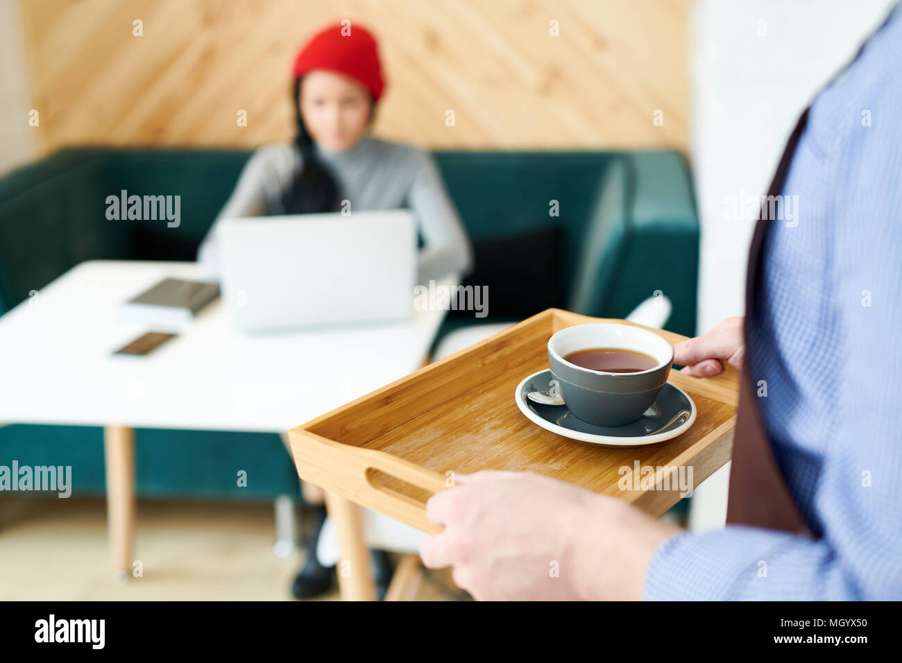Waiter Bringing Coffee in Cafe Stock Photo - Alamy