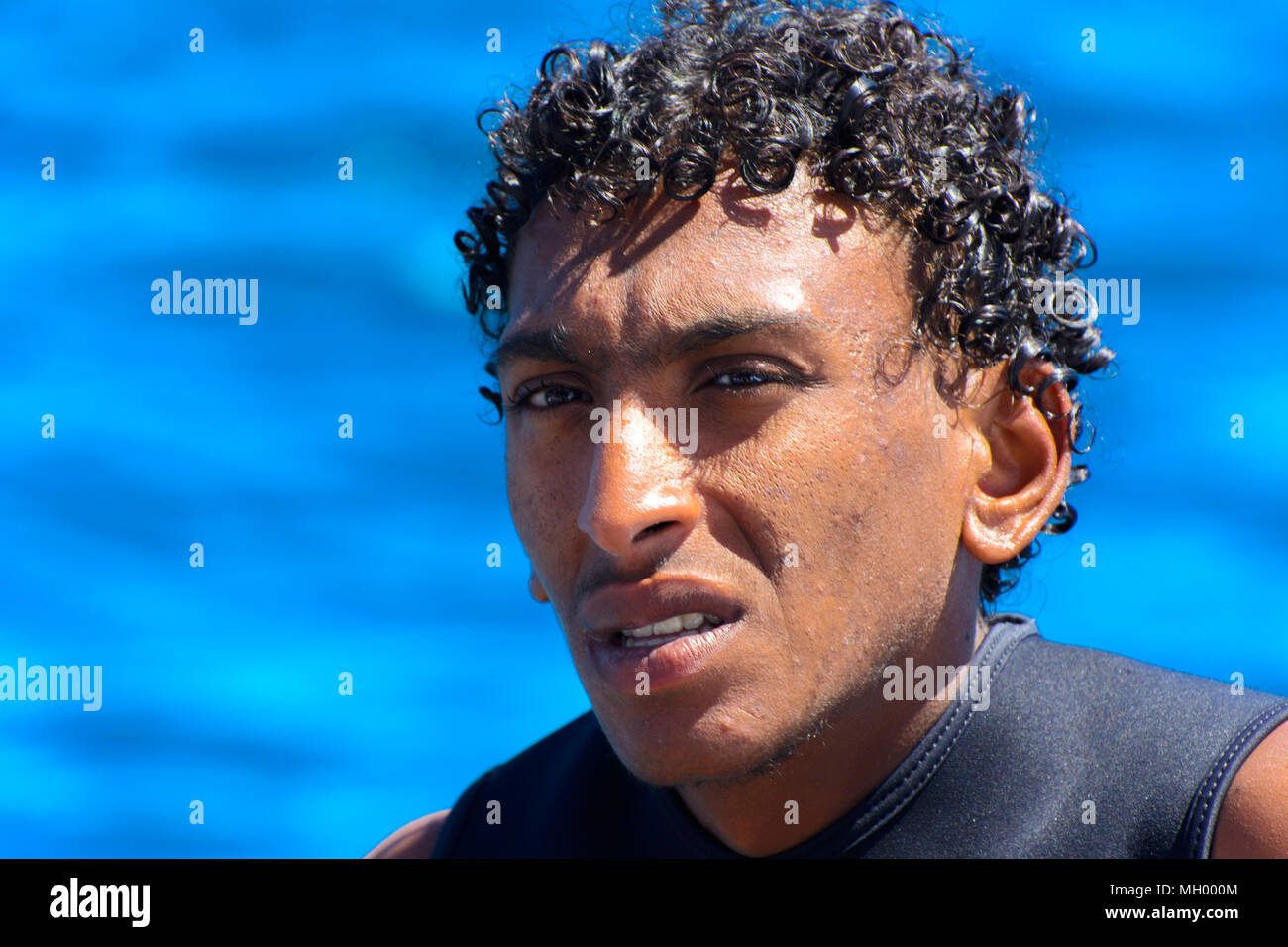 Sharm el-Sheikh, Egypt - March 14, 2018. Portrait of an african diving ...