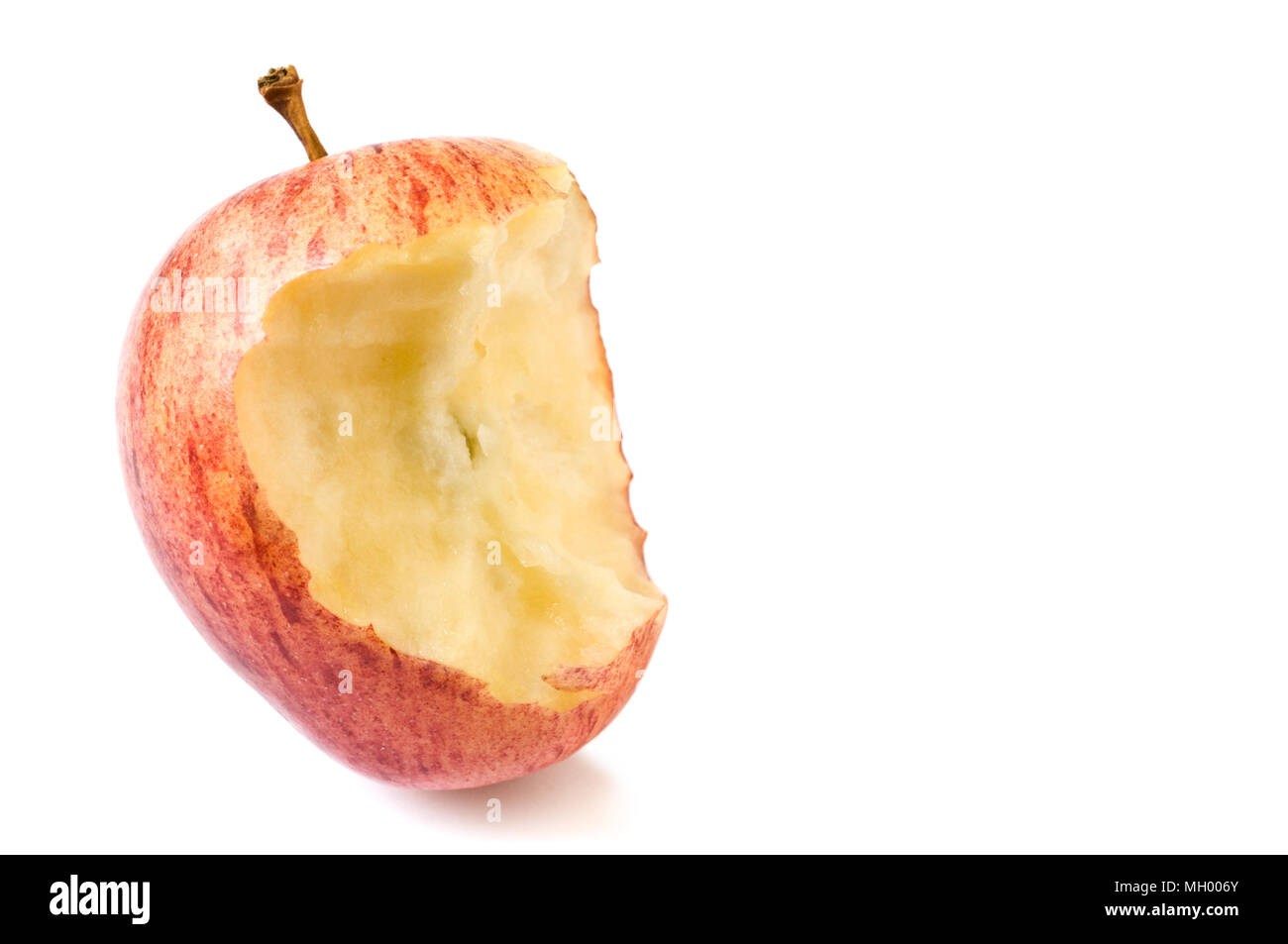 Eaten red apple isolated on white background Stock Photo - Alamy
