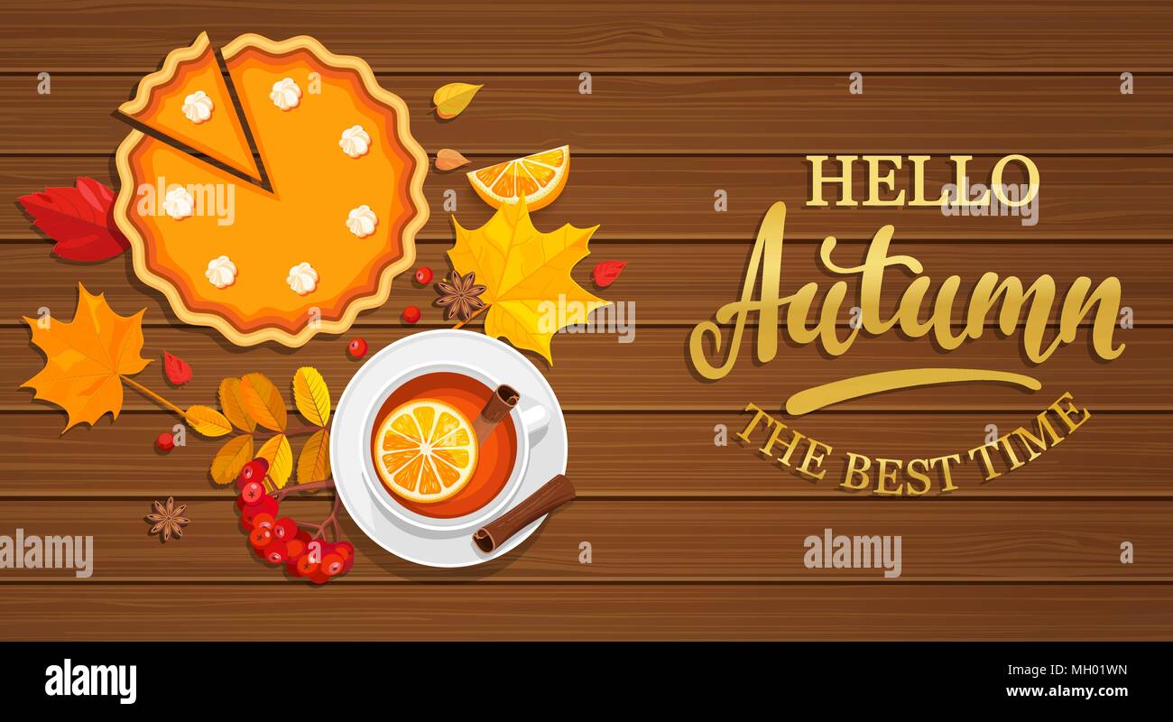 Hello autumn banner with pumpkin pie, tea and autumn leaves on wooden ...