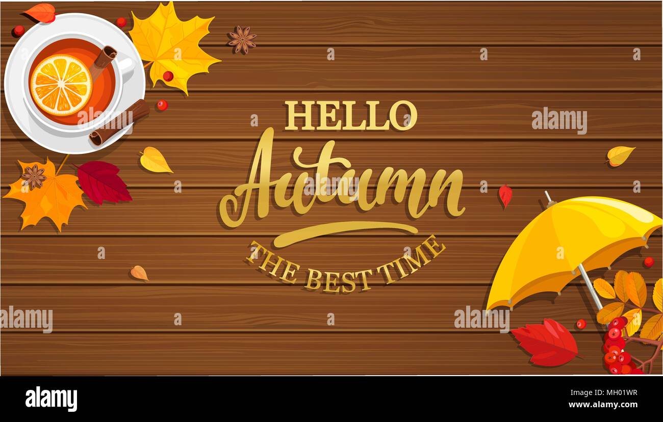 Hello Autumn banner on wooden background with umbrella, tea and autumn ...