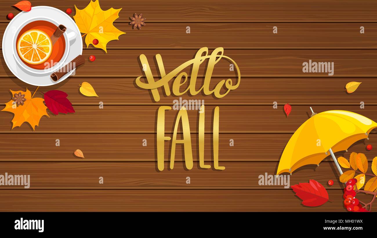 Hello Fall lettering on wooden background with tea, umbrella and autumn ...