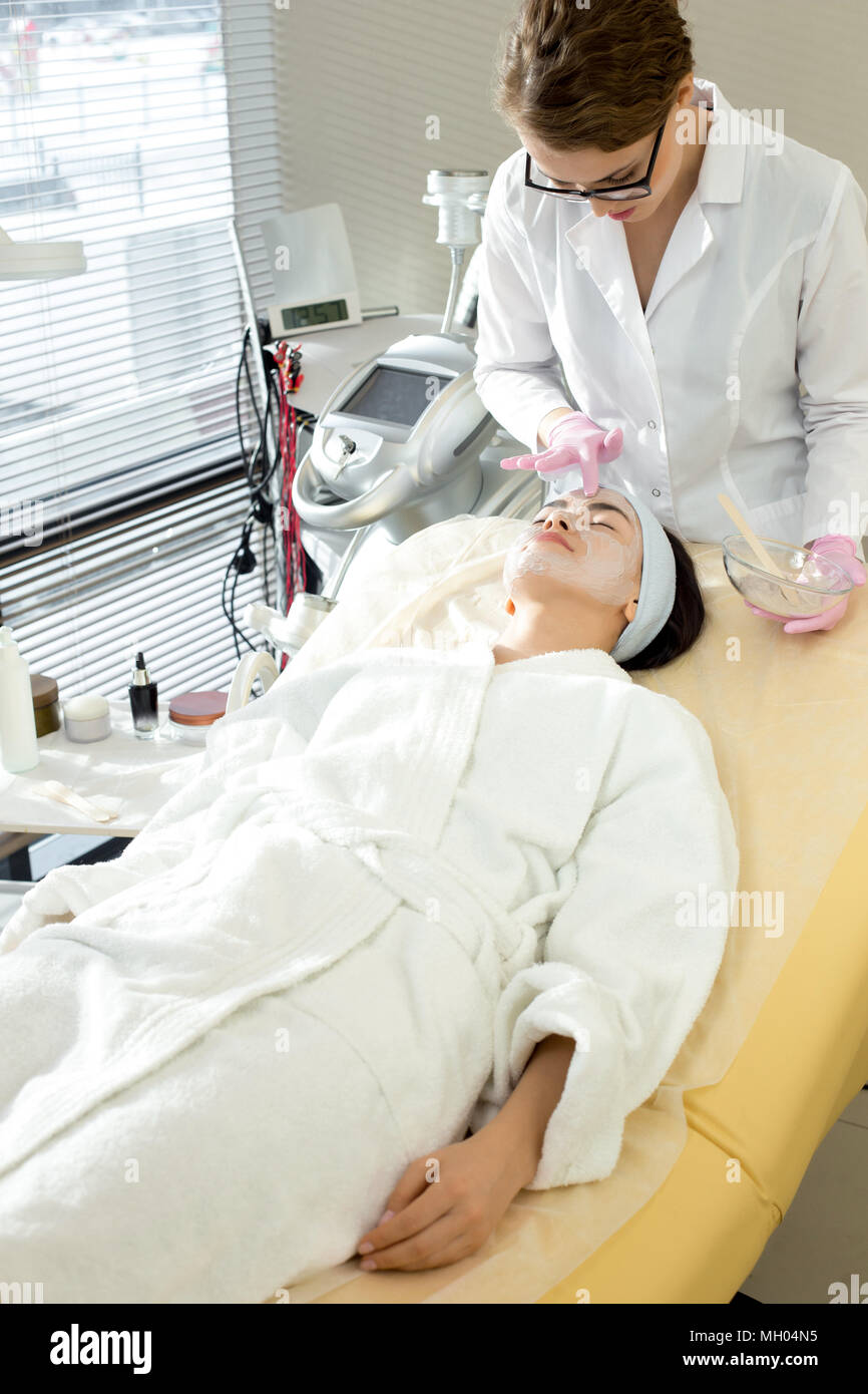 Woman Enjoying Beauty Treatment Stock Photo - Alamy