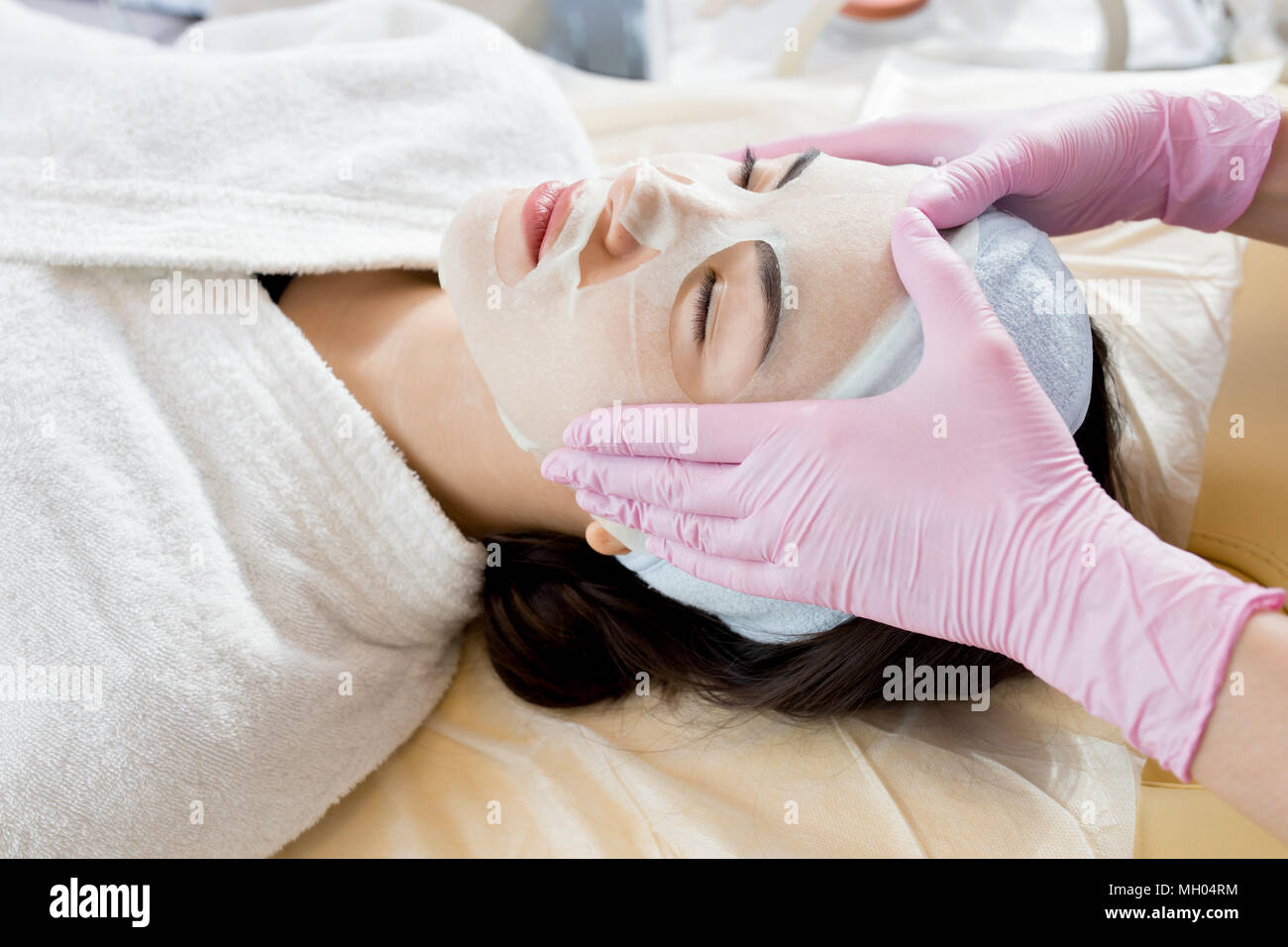 Asian Woman Enjoying Face Masks Stock Photo - Alamy