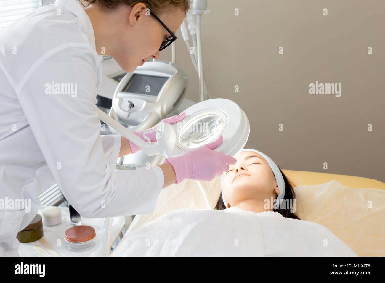 Inspecting skin hi-res stock photography and images - Alamy