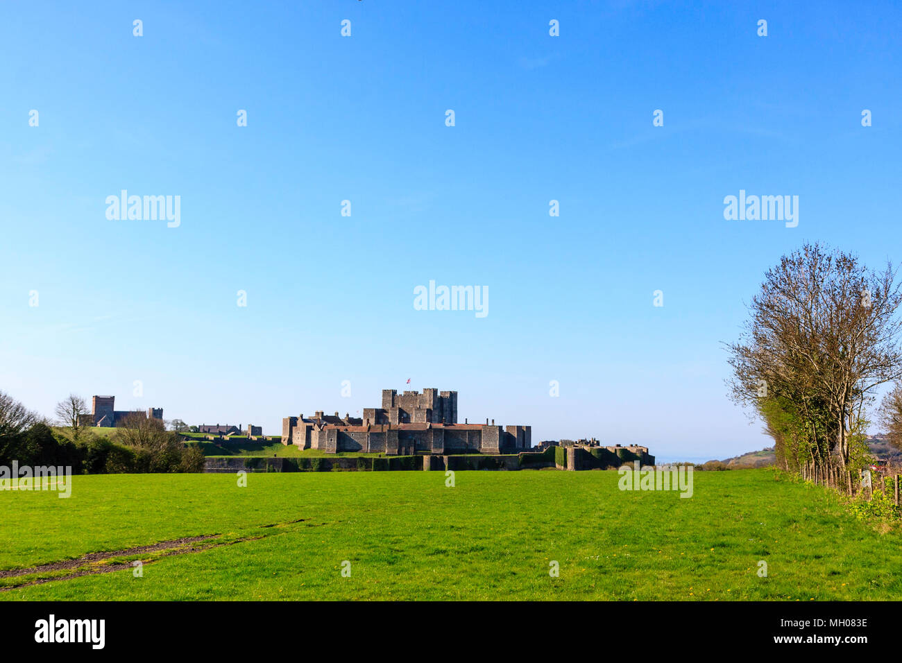 Dover castle, England. Distant view across field of the outer walls ...