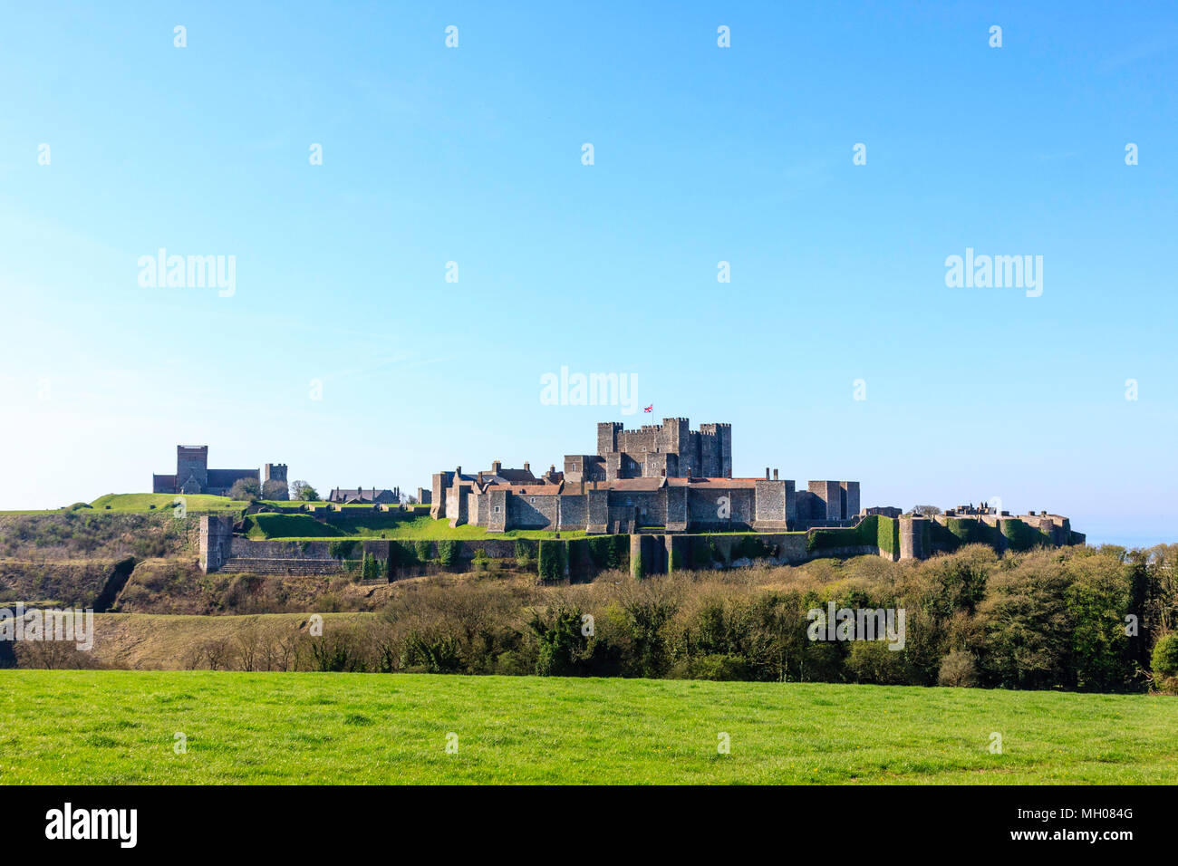 Dover castle, England. Distant view across field of the outer walls ...