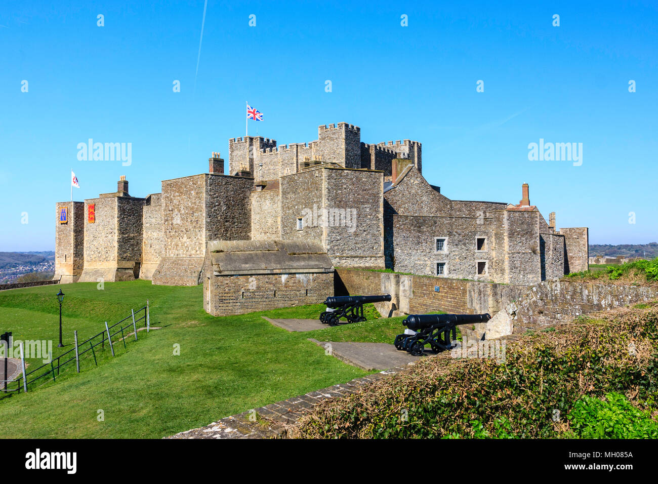 Dover castle, England. Bell battery cannons on the outer wall, with the ...
