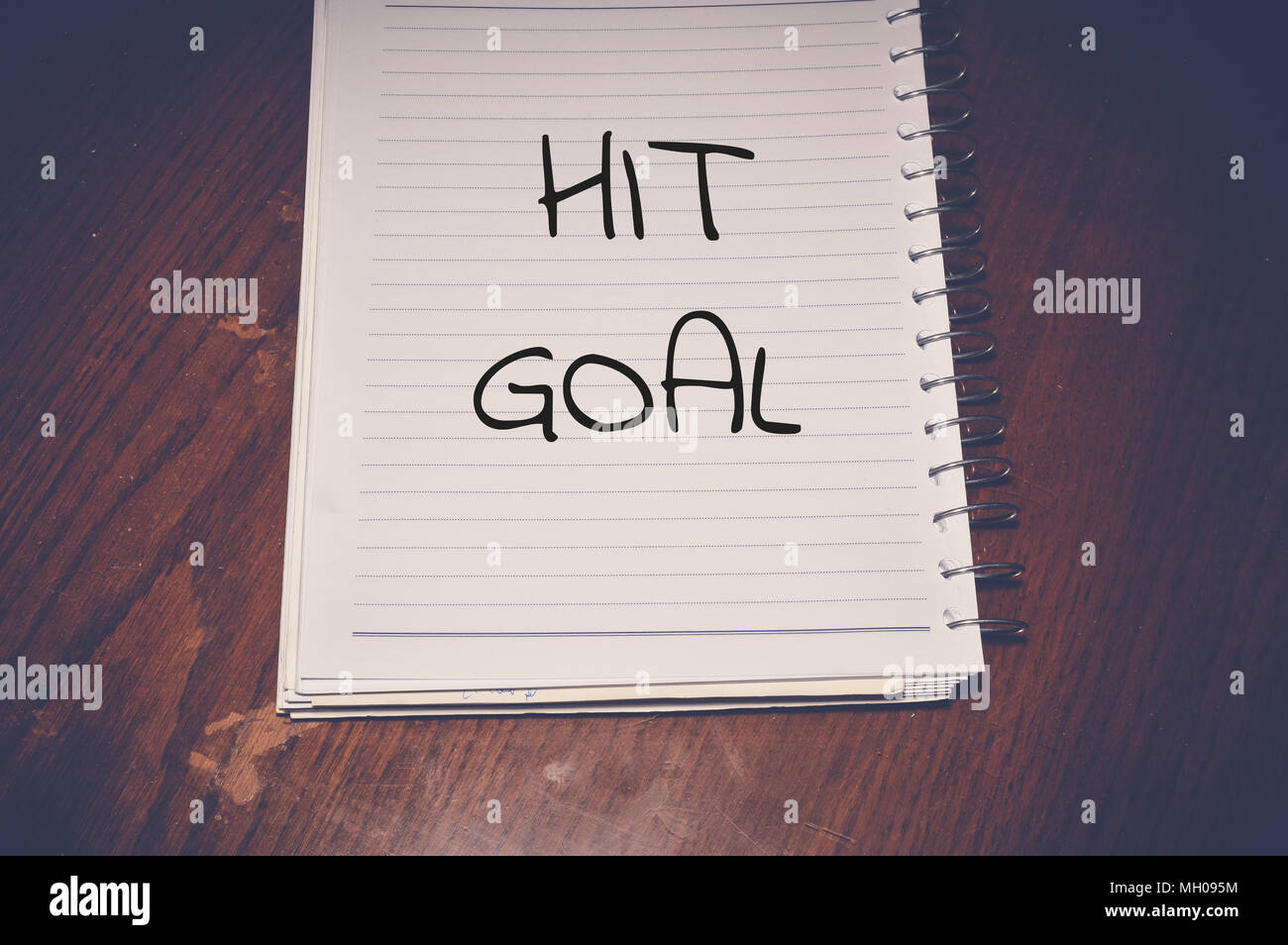 Hit goal word written on white paper Stock Photo - Alamy